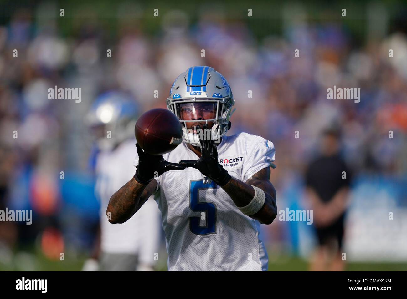Detroit Lions safety DeShon Elliott catches during a drill at the Lions ...