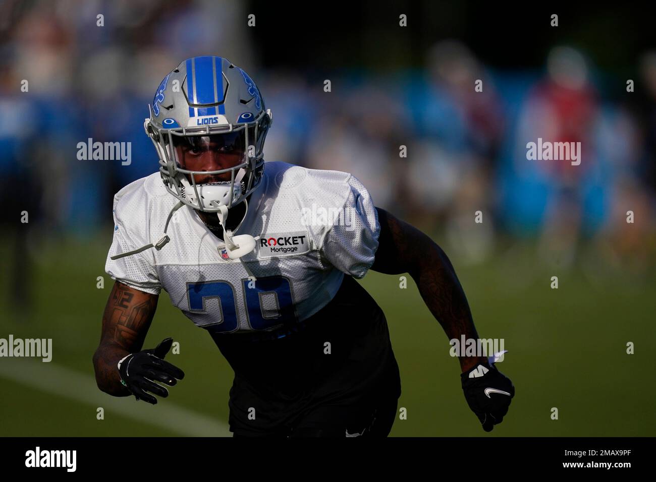 Detroit Lions cornerback Mark Gilbert runs during a drill at the Lions ...