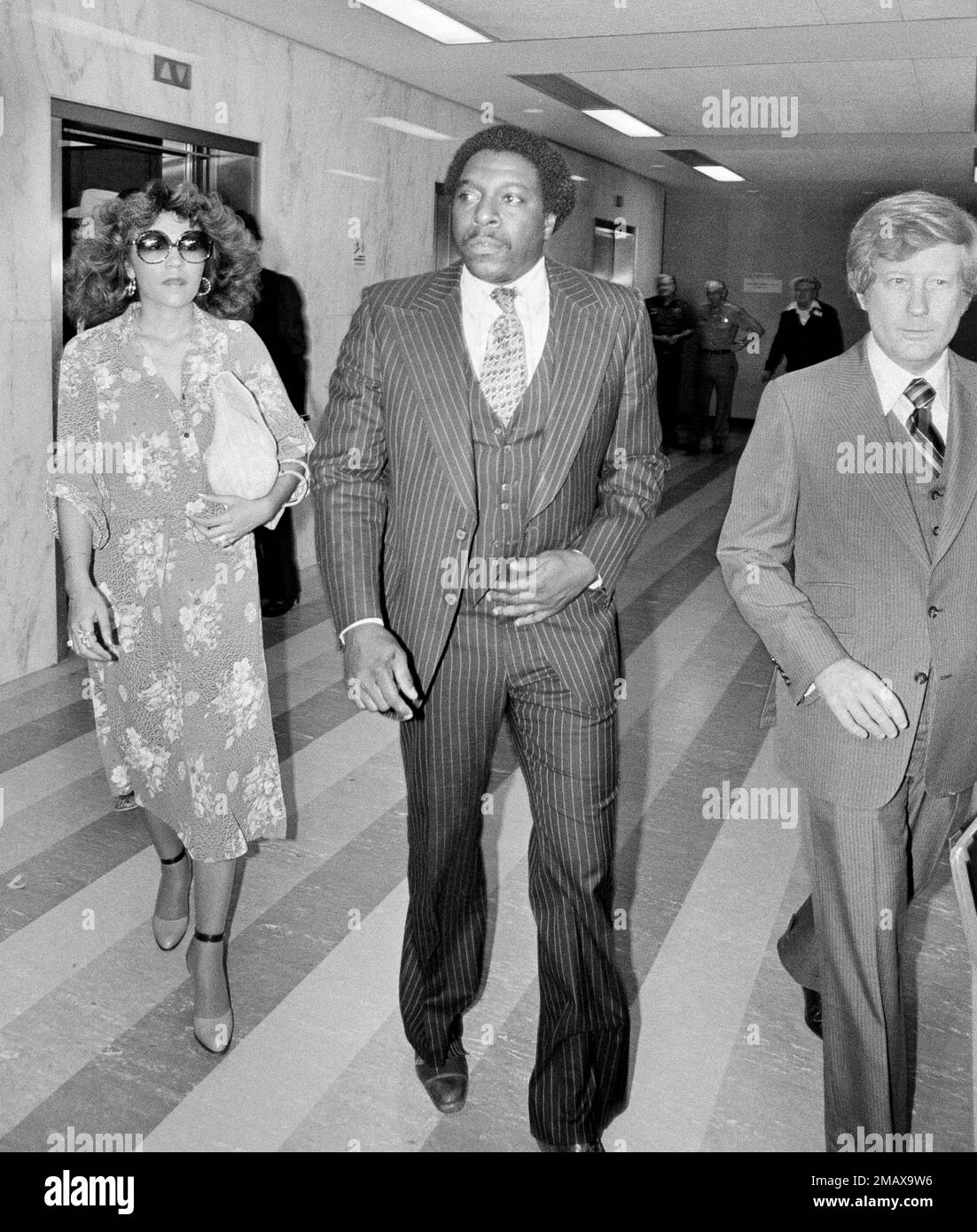 Former Dallas Cowboy Bob Hayes, center, and his wife Janice enter the ...