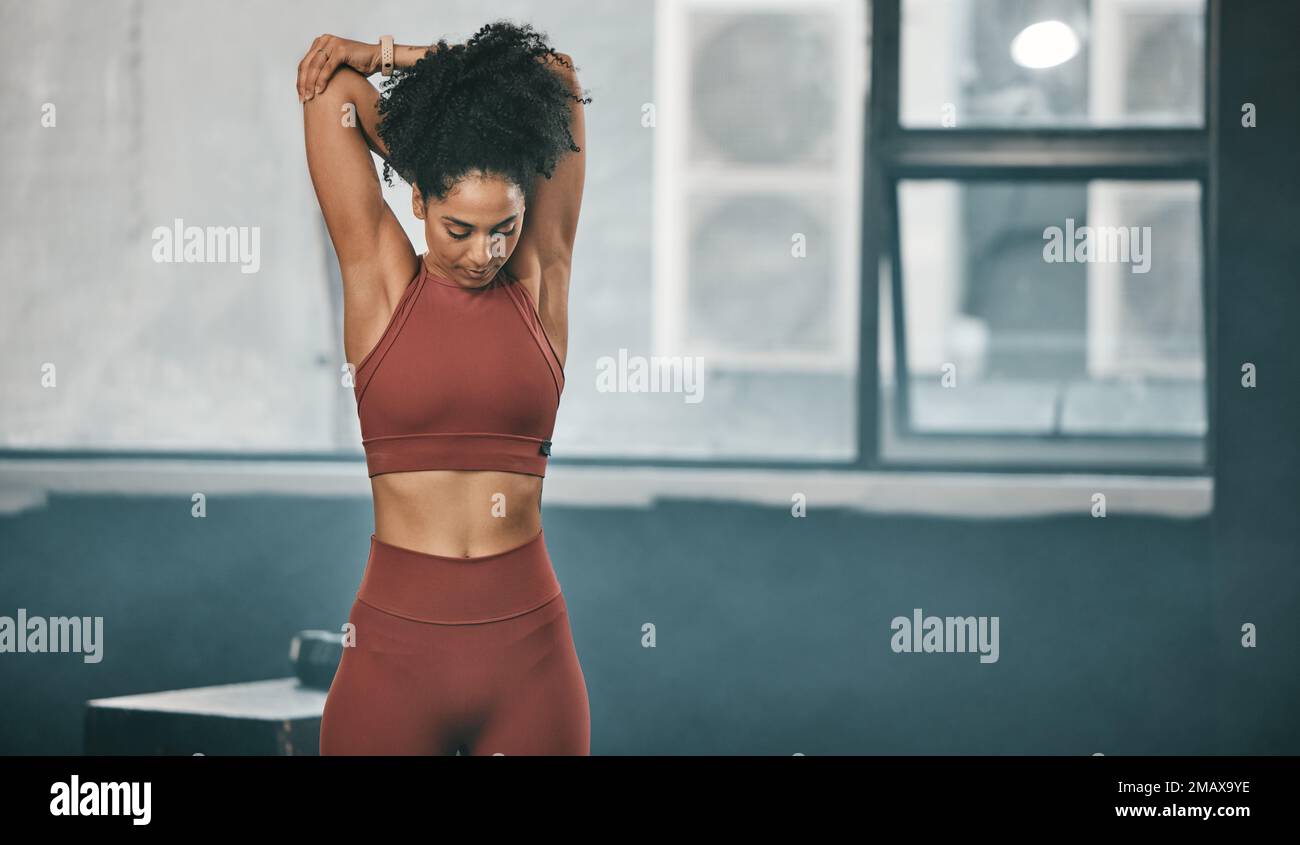 Exercise, black woman and stretching in gym, fitness and workout for ...