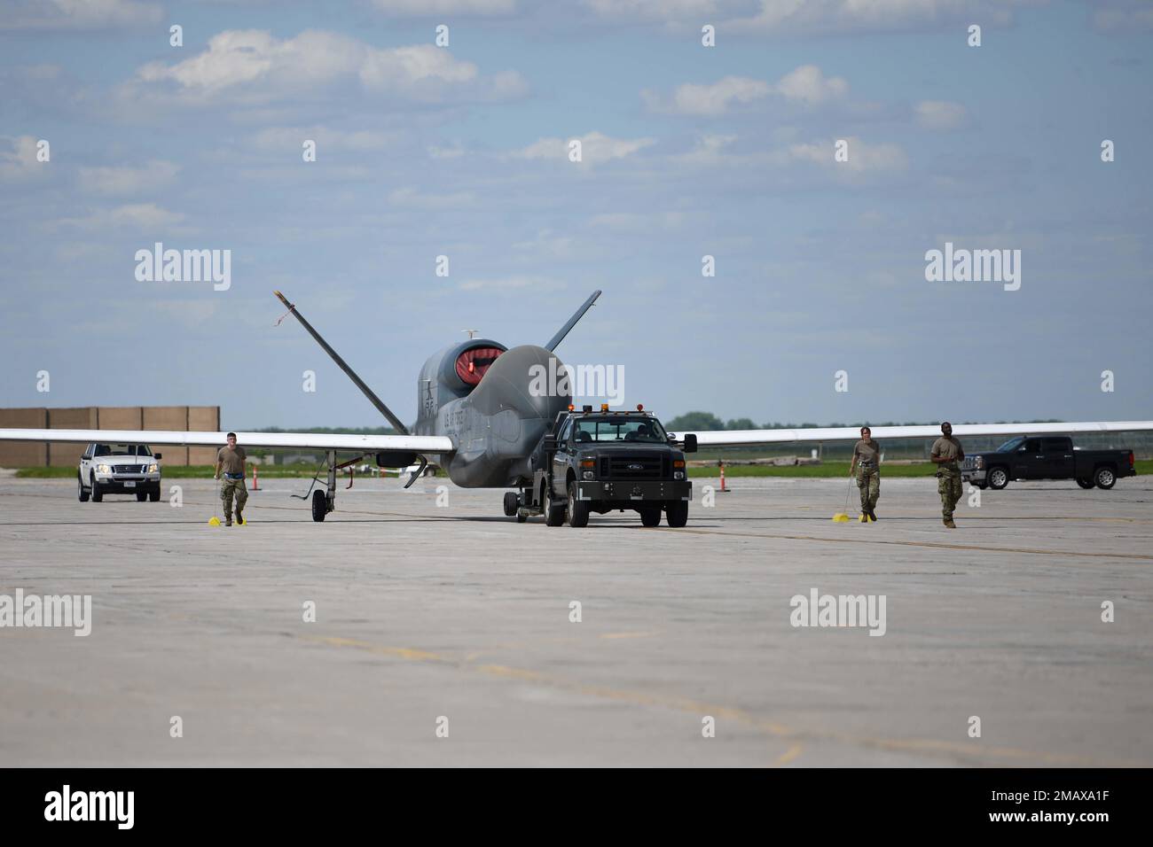 Airmen assigned to the 319th Aircraft Maintenance Squadron from Grand ...