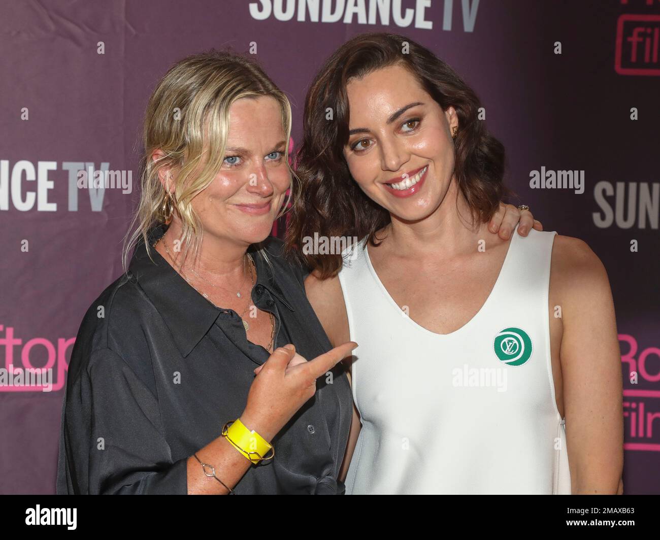 Actors Amy Poehler, left, and Aubrey Plaza, right, attend the premiere ...