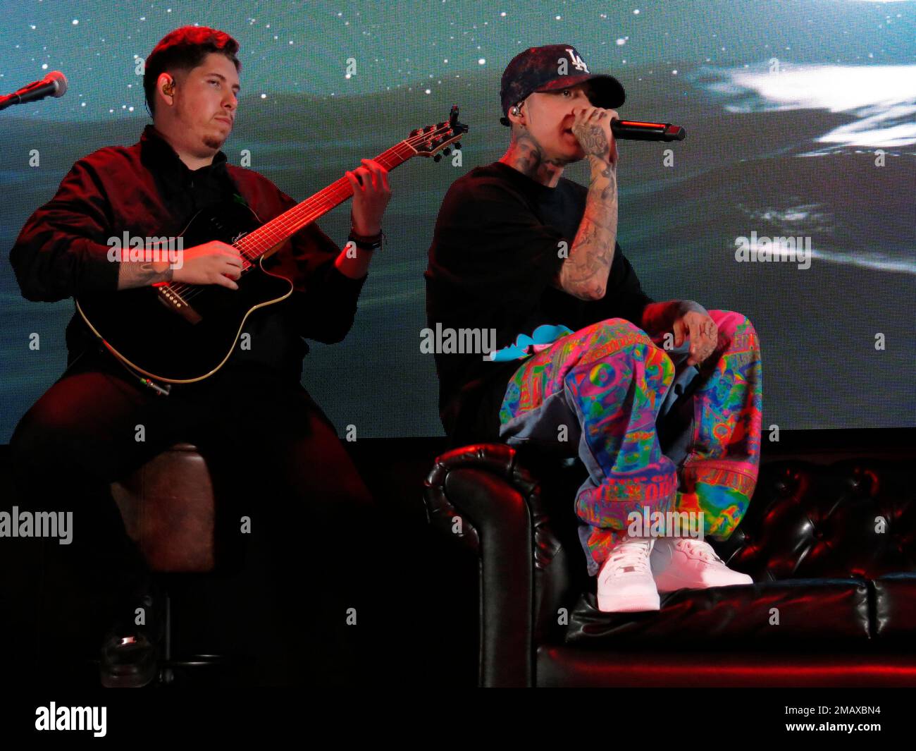 Mexican rapper Santa Fe Klan, right, performs during a concert in ...