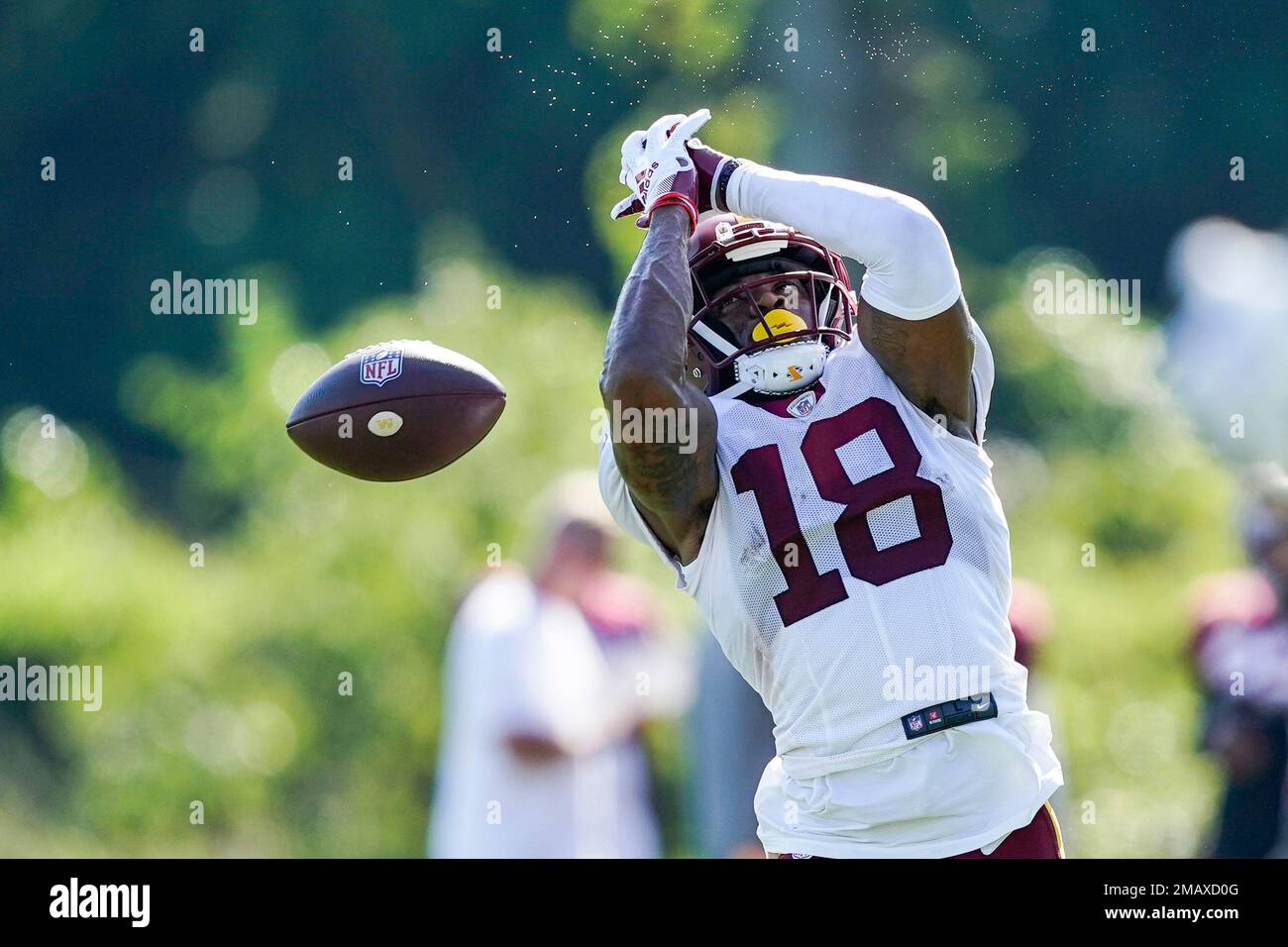 Washington Commanders wide receiver Matt Cole (18) misses a pass during ...