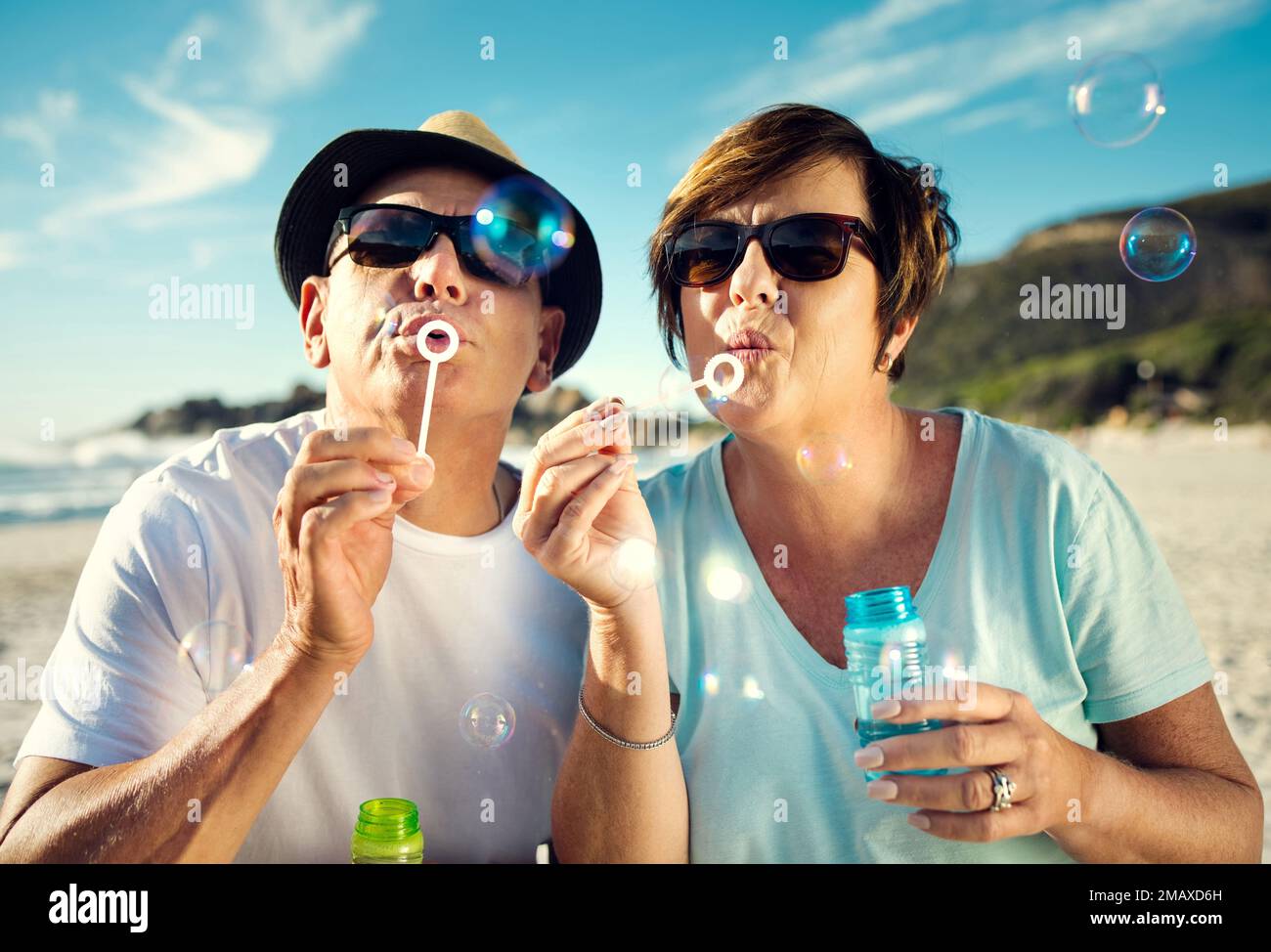 Were retired and ready for a new beginning. a mature couple blowing ...