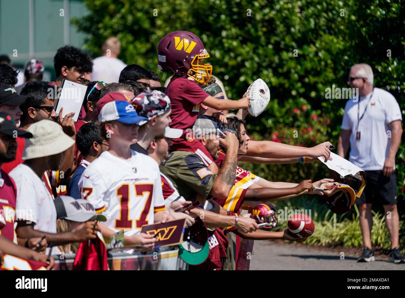 Washington Commanders fans ask for autograph after practice at the team ...
