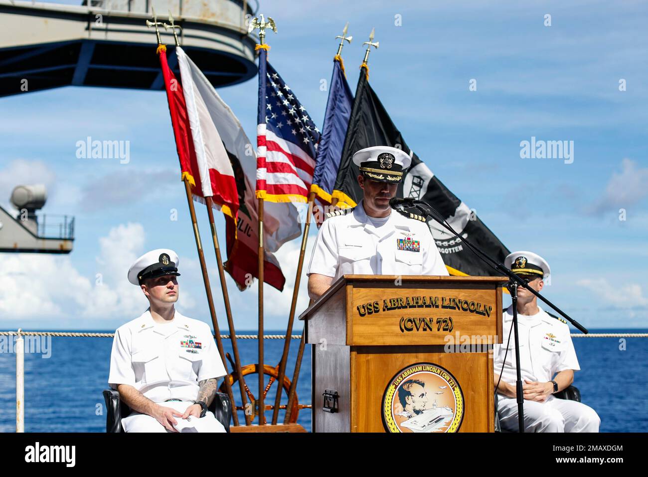 PHILIPPINE SEA (June 7, 2022) Capt. Patrick Baker, middle, executive ...