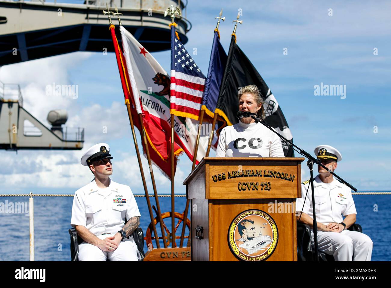 PHILIPPINE SEA (June 7, 2022) Capt. Amy Baurschimdt, middle, commanding ...