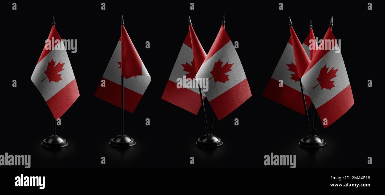 Small national flags of the Canada on a black background Stock Photo ...