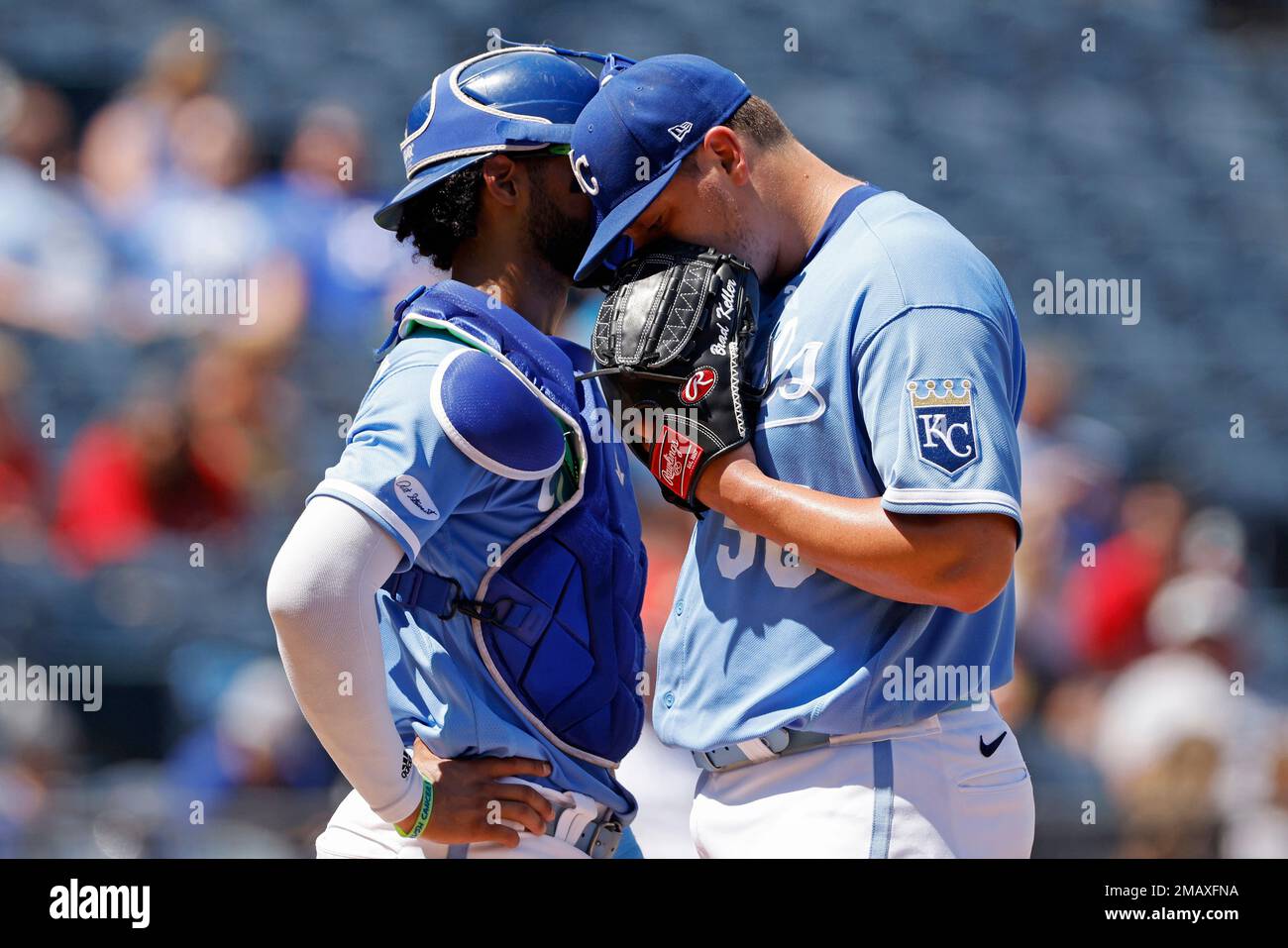 Kansas City Royals catcher MJ Melendez, left, and pitcher Brad Keller ...