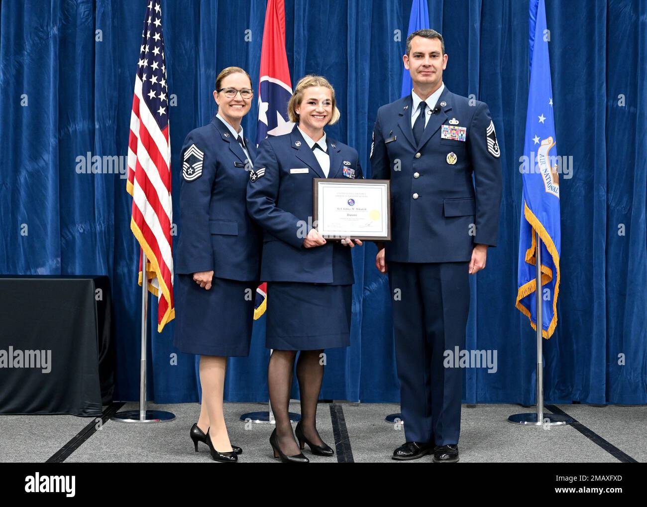 U.S. Air Force Senior Airman Ashley Mikulcik receives a Distinguished ...