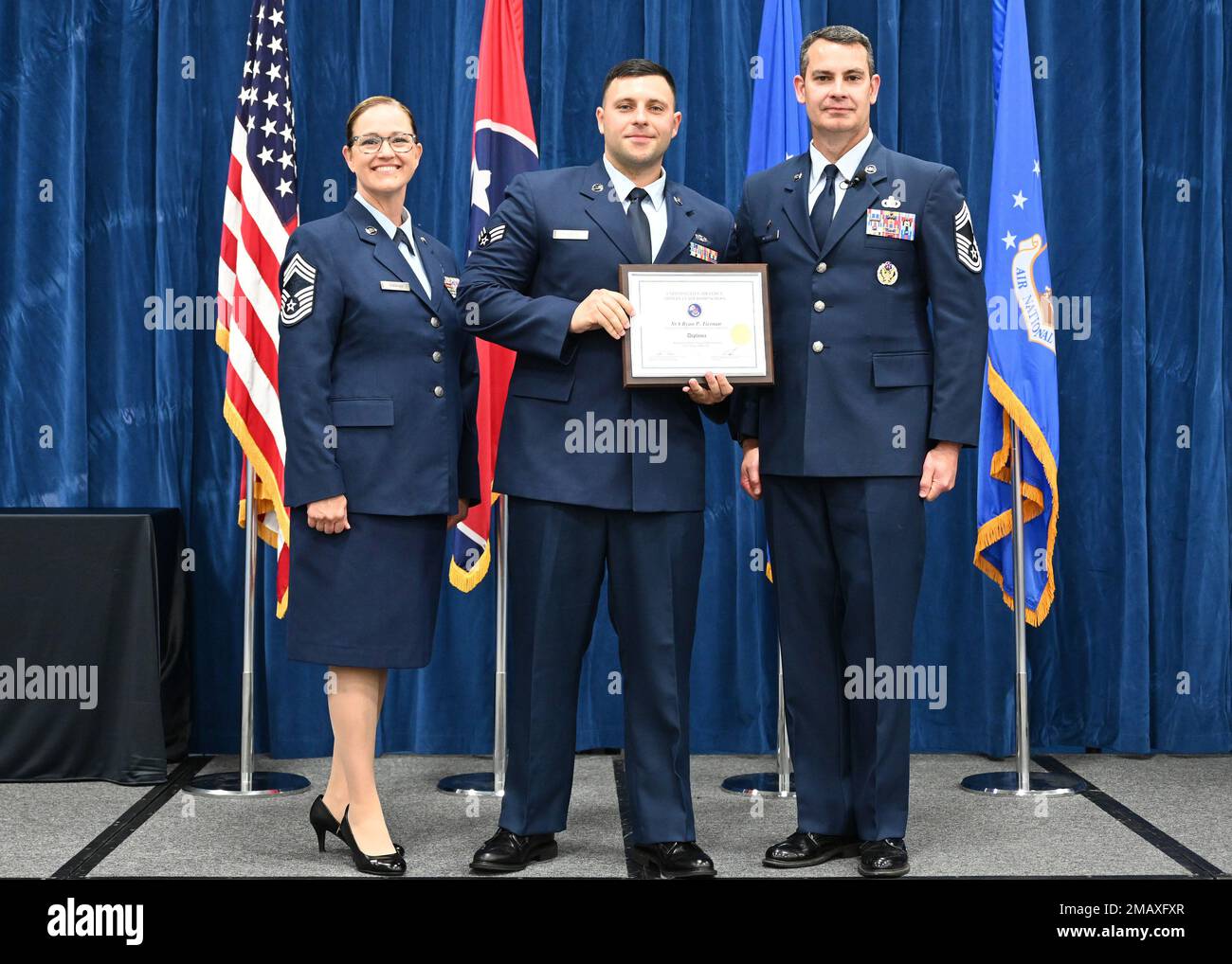U.S. Air Force Senior Airman Ryan Tiernan receives a Distinguished ...