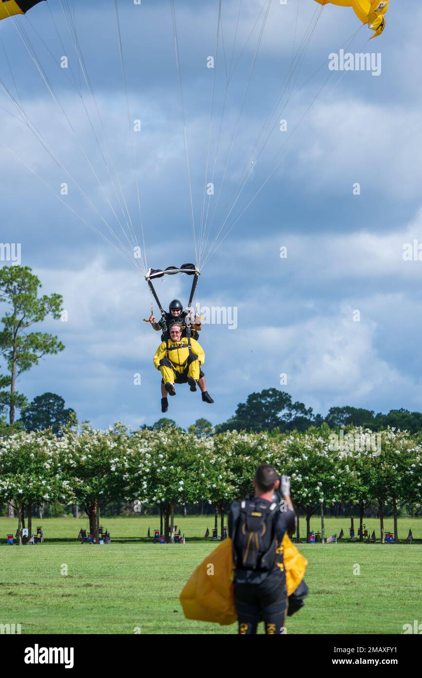 Sgt. Jonathan Pemberton of the U.S. Army Parachute Team makes a tandem ...