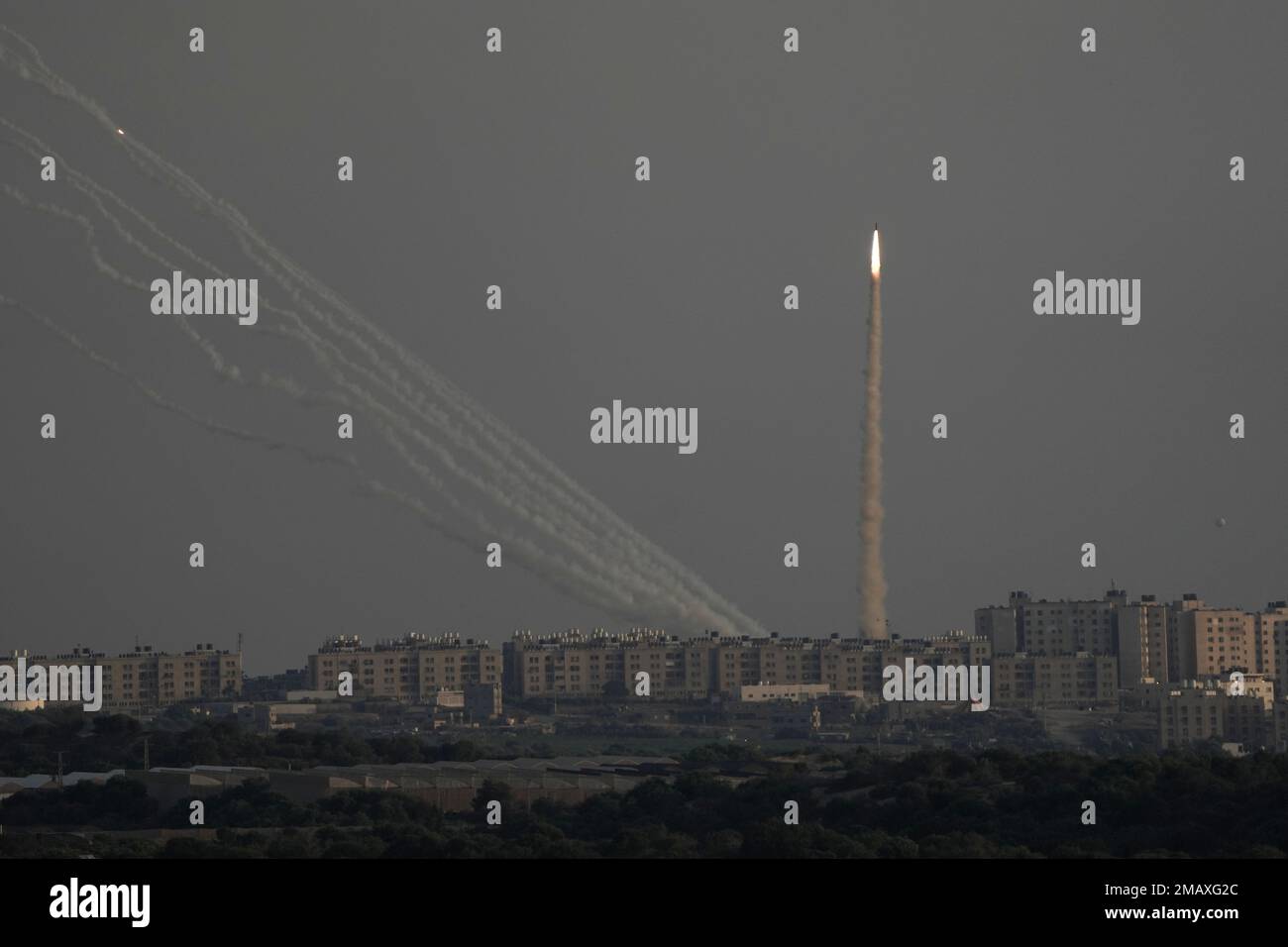 FILE - Rockets launched from the Gaza Strip towards Israel are seen ...