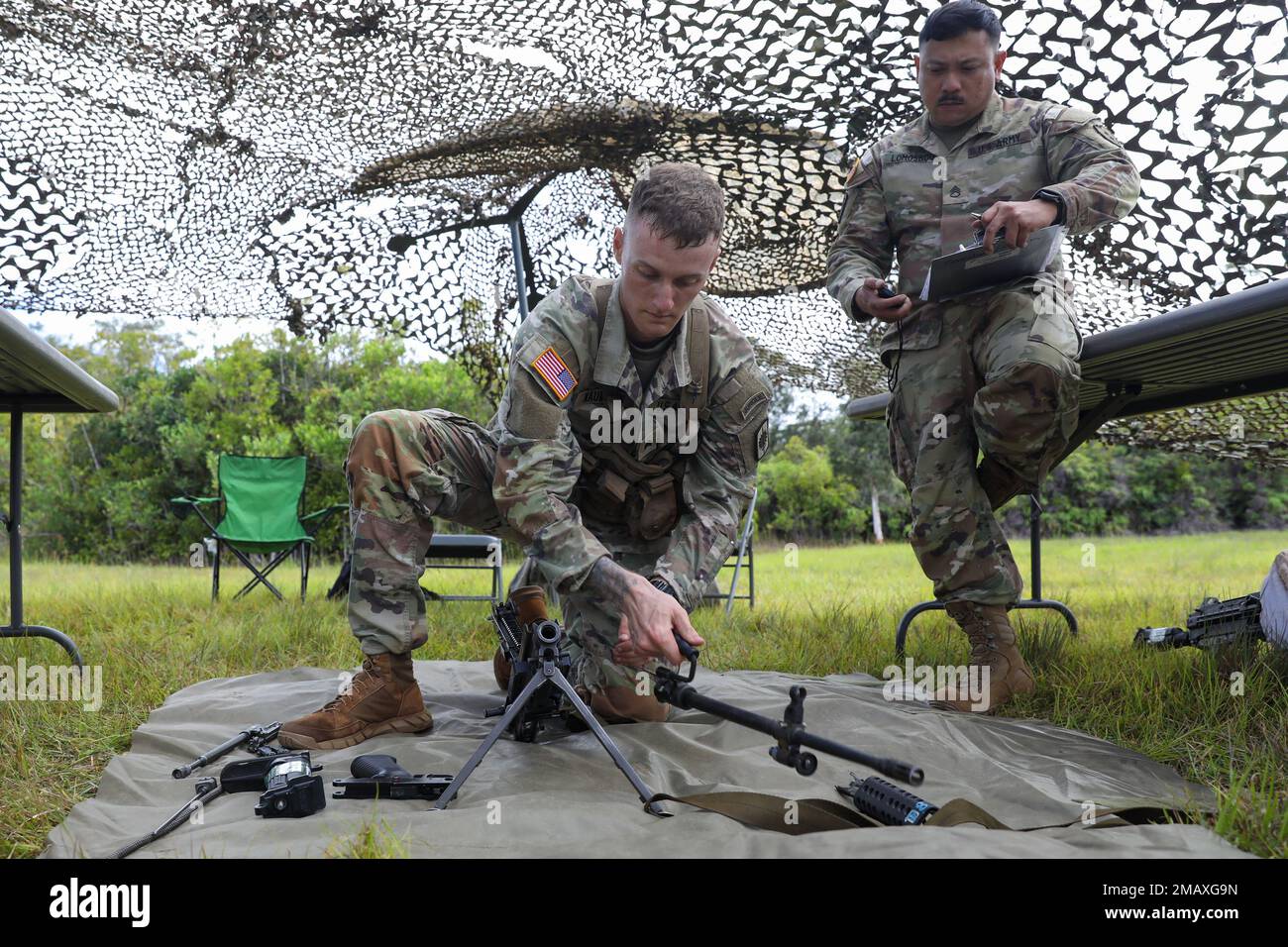 Sgt. Casey Naumann, a military police assigned to 8th Theater ...
