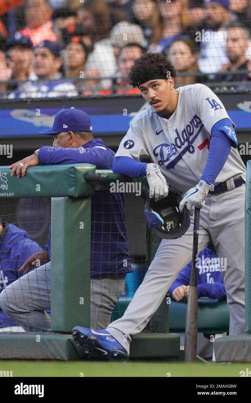 Los Angeles Dodgers manager Dave Roberts, left, and Miguel Vargas ...