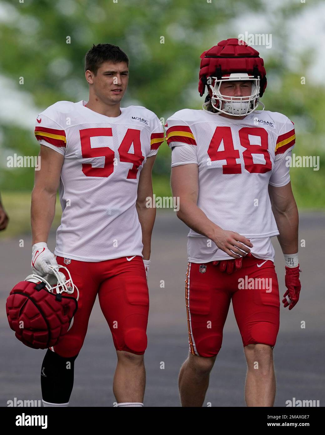 Kansas City Chiefs linebackers Leo Chenal (54) and Mike Rose (48 ...