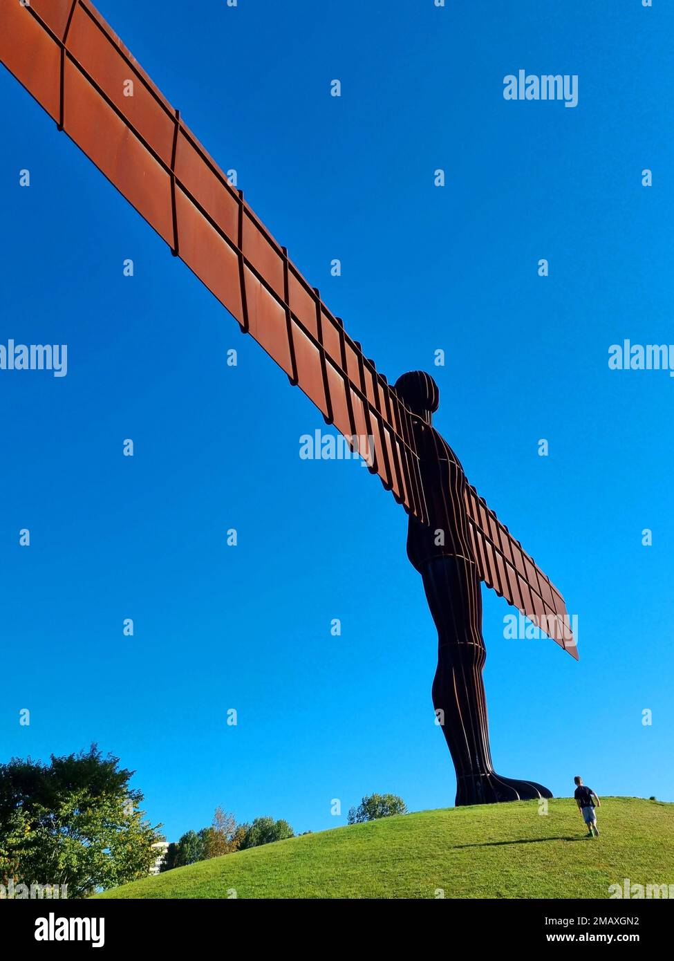 A famous Angel of the North in Gateshead, United Kingdom against blue ...