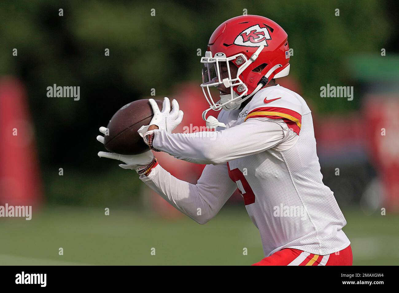 Kansas City Chiefs safety Bryan Cook catches a ball during NFL football ...