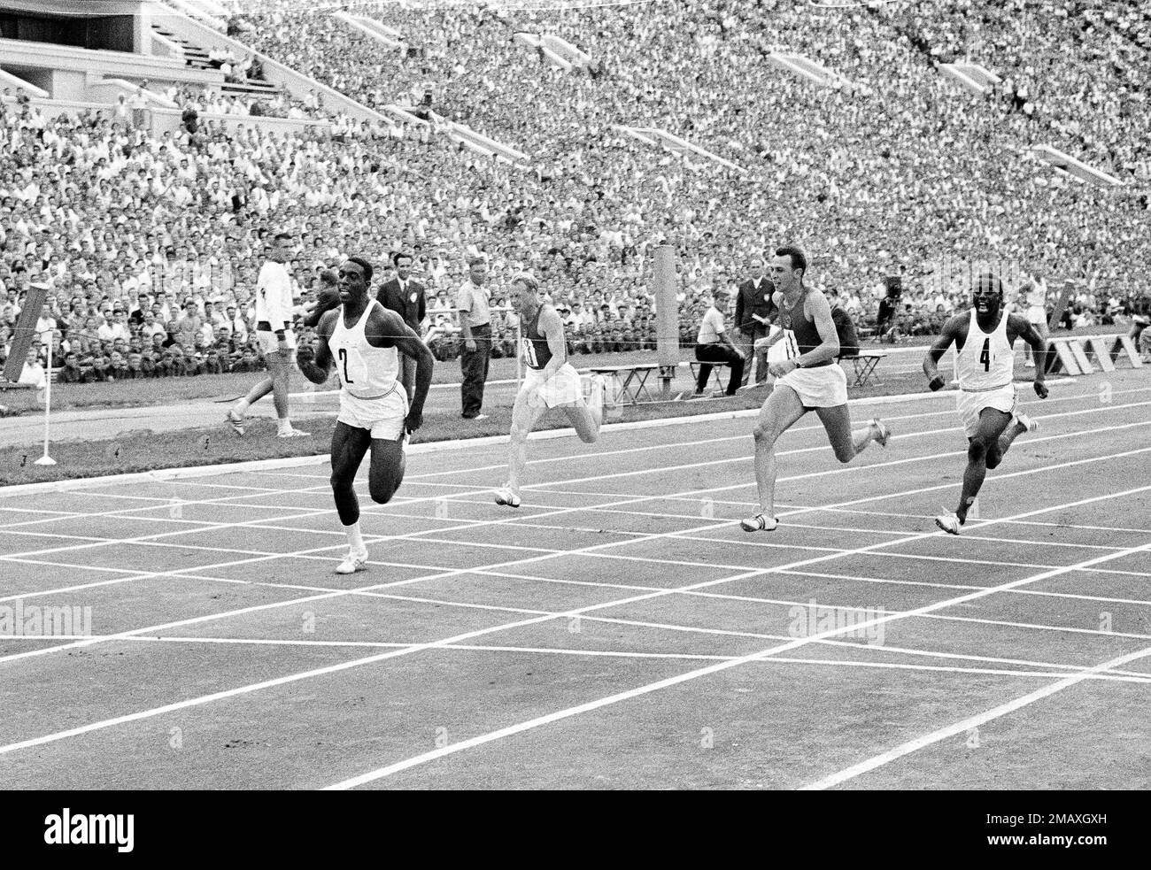Bob Hayes, left, of Florida A&M, wins the 100-meter dash in 10.2 seconds at the U.S.- Russia ...