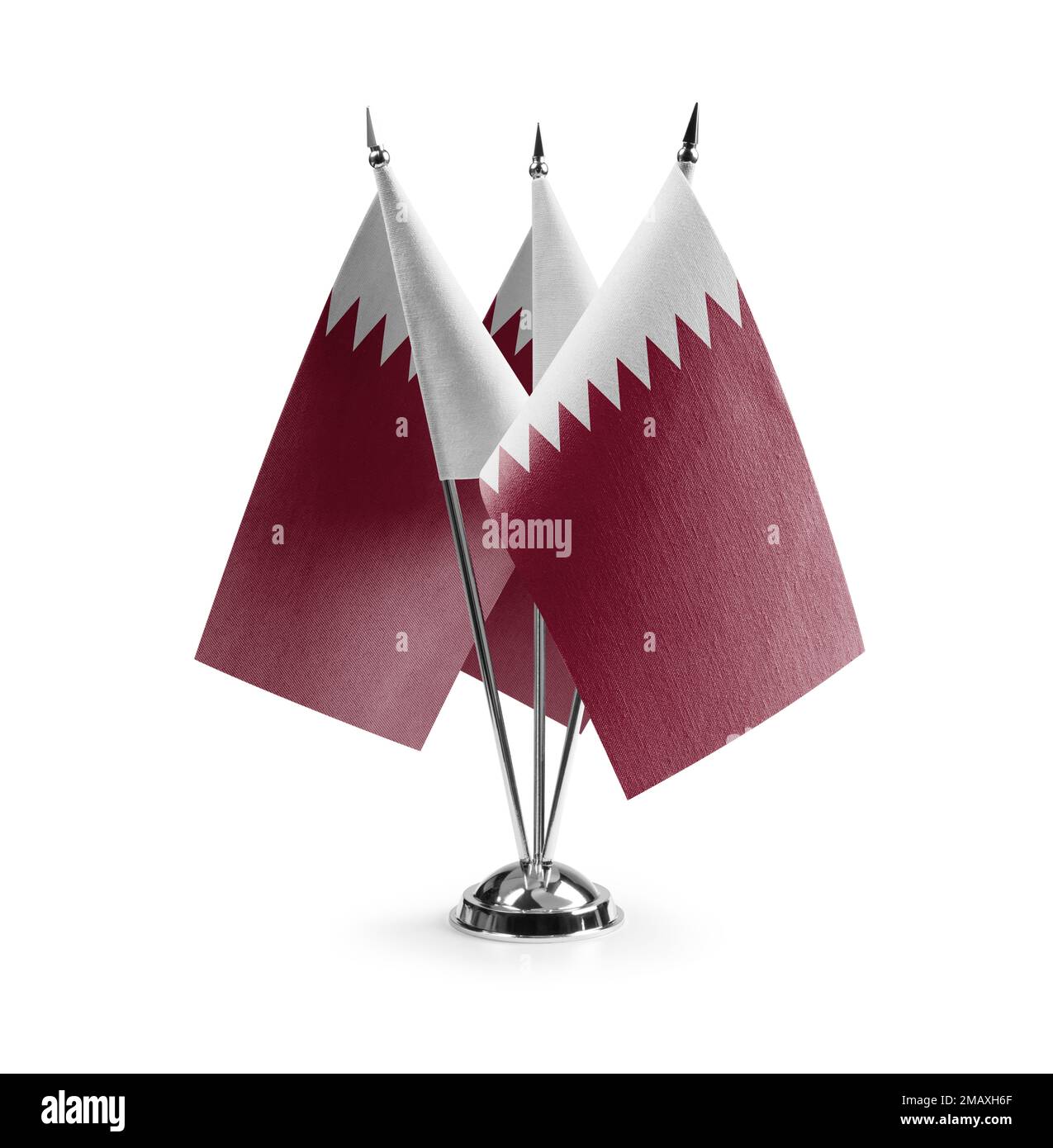 Small national flags of the Qatar on a white background Stock Photo - Alamy