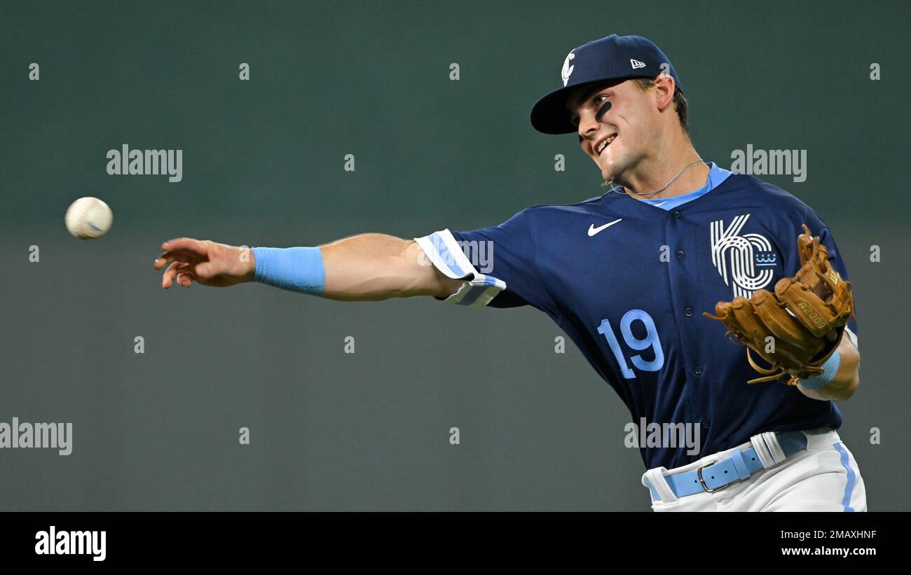 Kansas City Royals second baseman Michael Massey throws to first for an ...