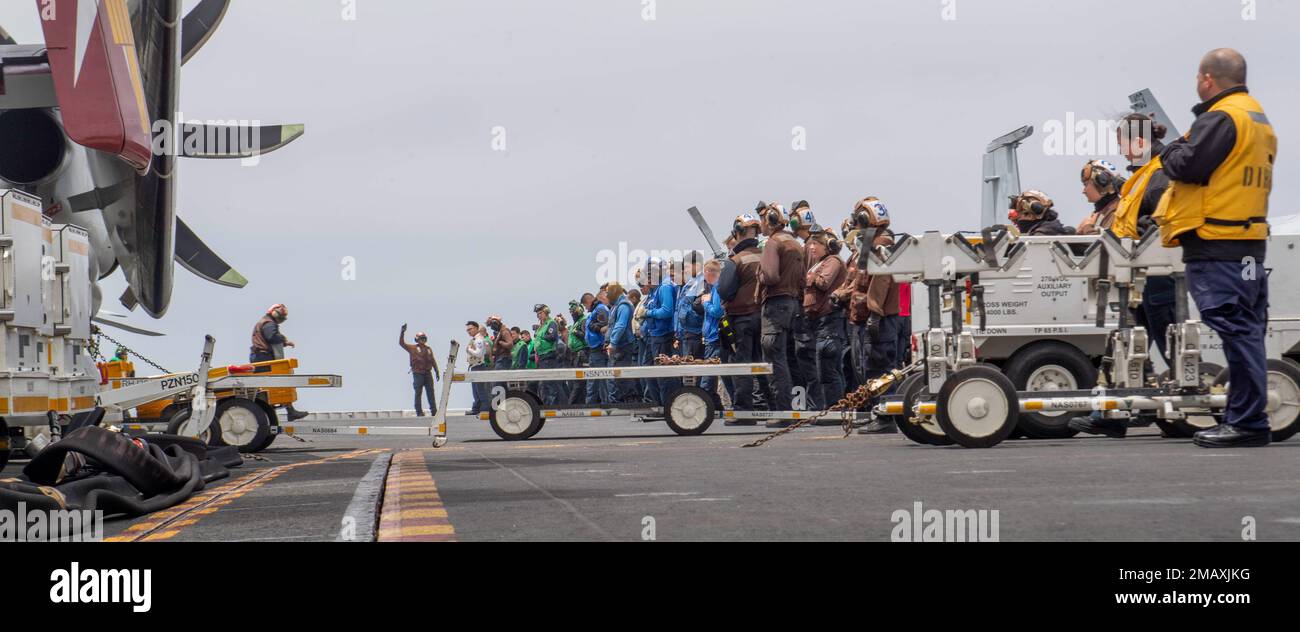 220607-N-DU622-1236 PACIFIC OCEAN (June 7, 2022) Sailors line up for a ...