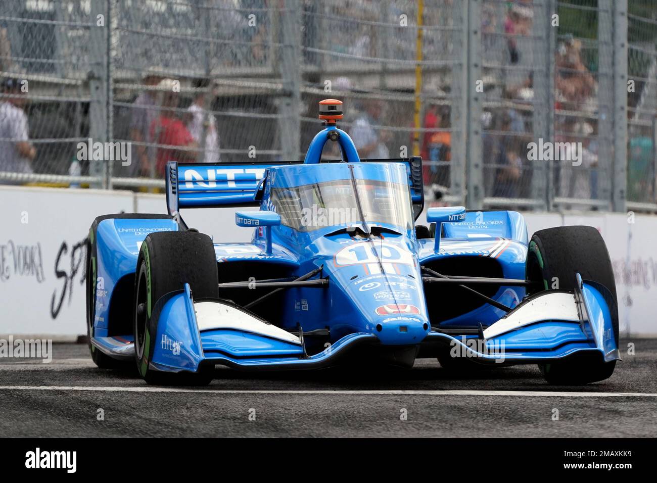 Alex Palou drives through a turn during the Music City Grand Prix auto ...