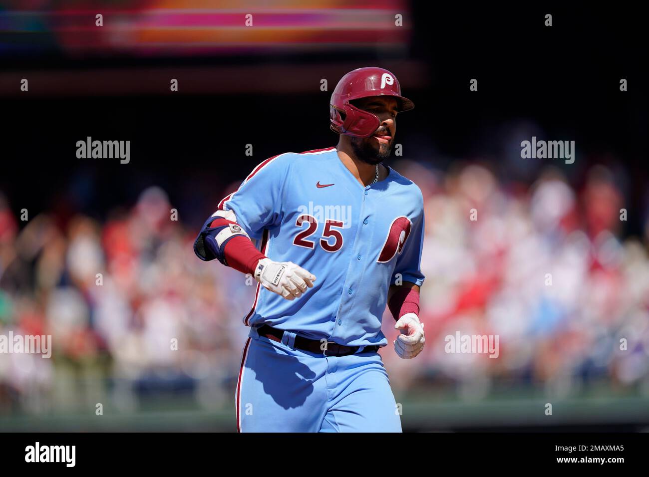 Philadelphia Phillies' Darick Hall runs the basses after hitting a home ...
