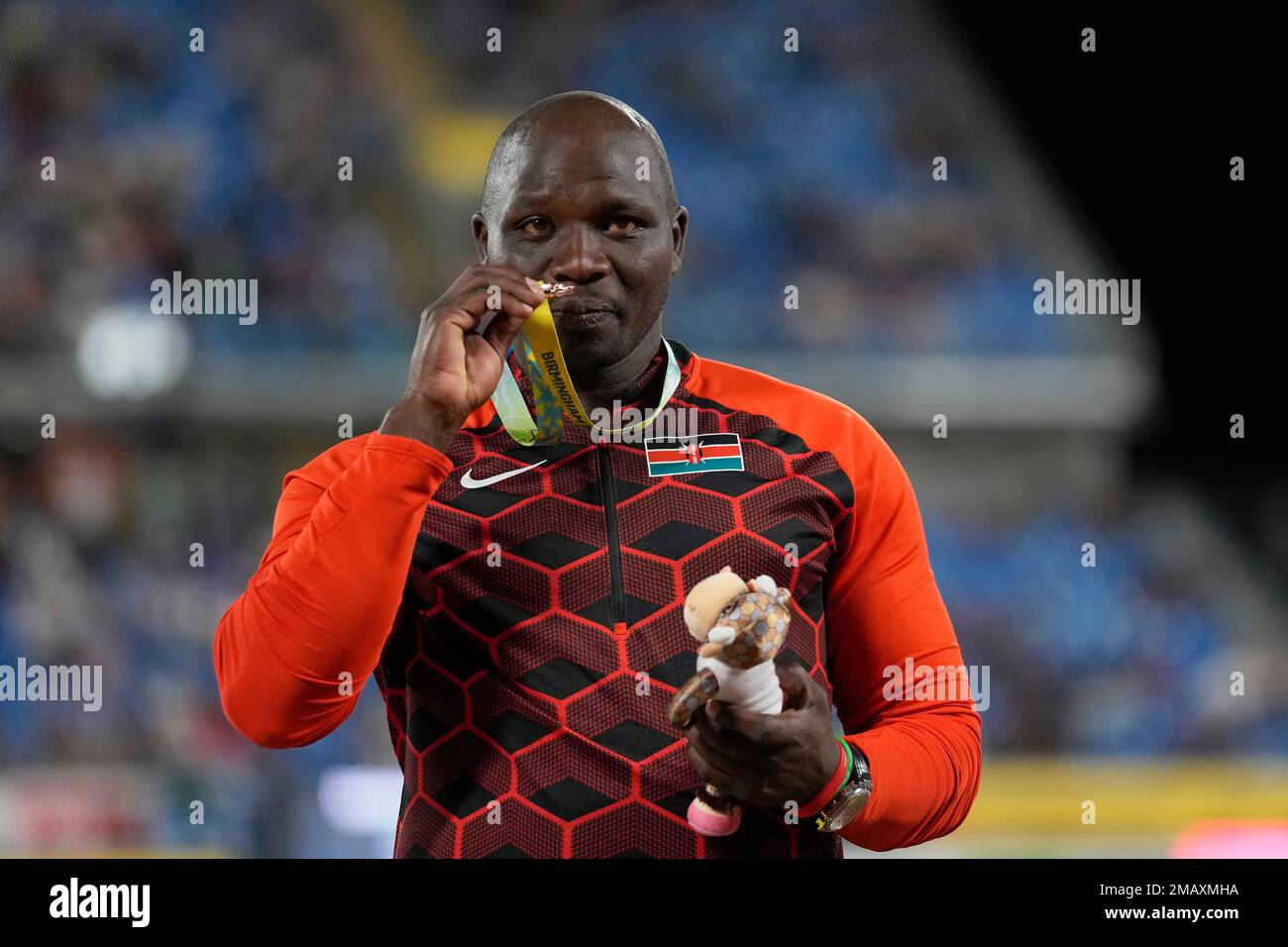 Julius Yego of Kenya poses on the podium after winning the bronze medal ...