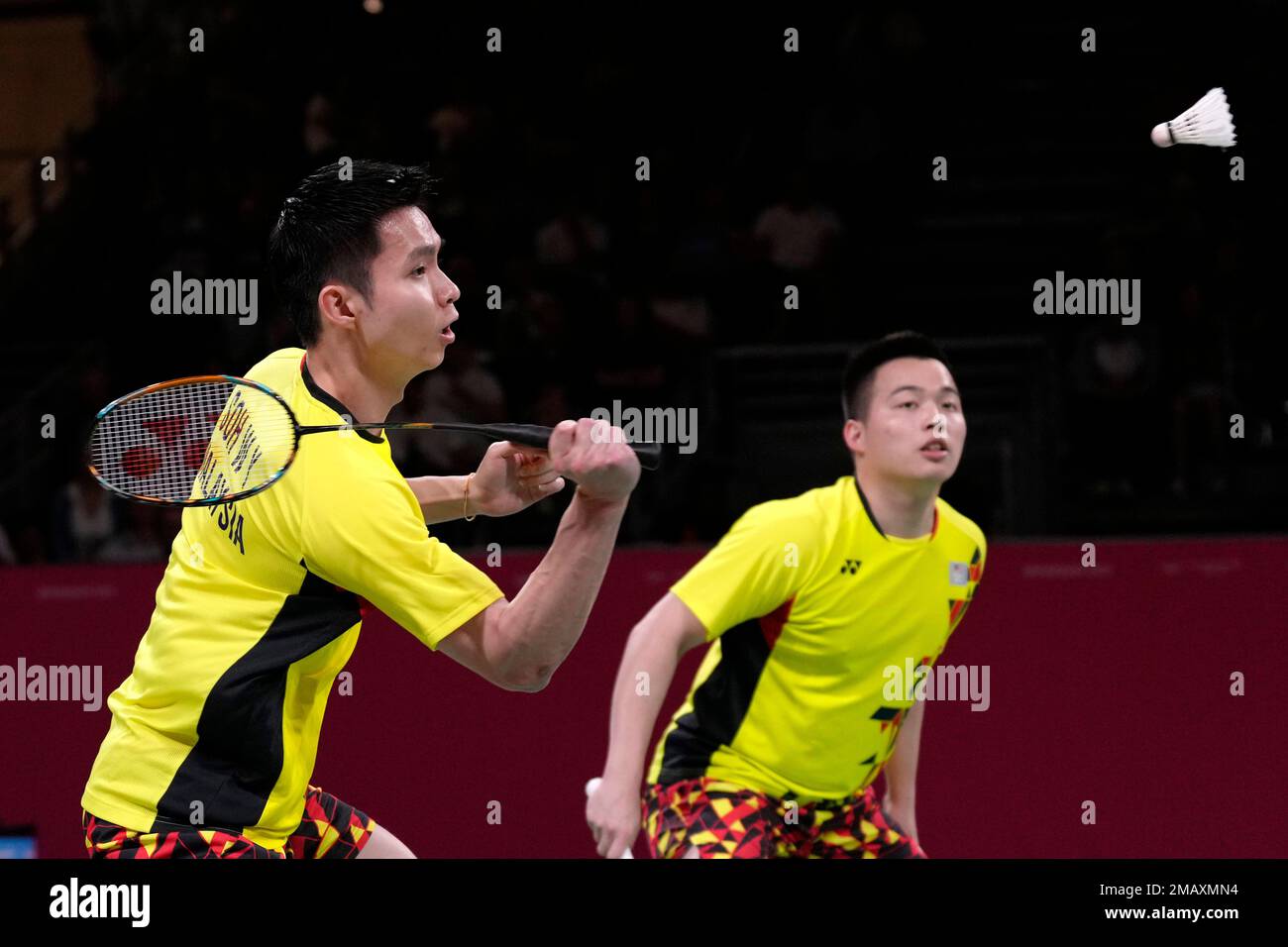 Chia Teng Fong Aaron, right, and Soh Wooi Yik of Malaysia play a return ...