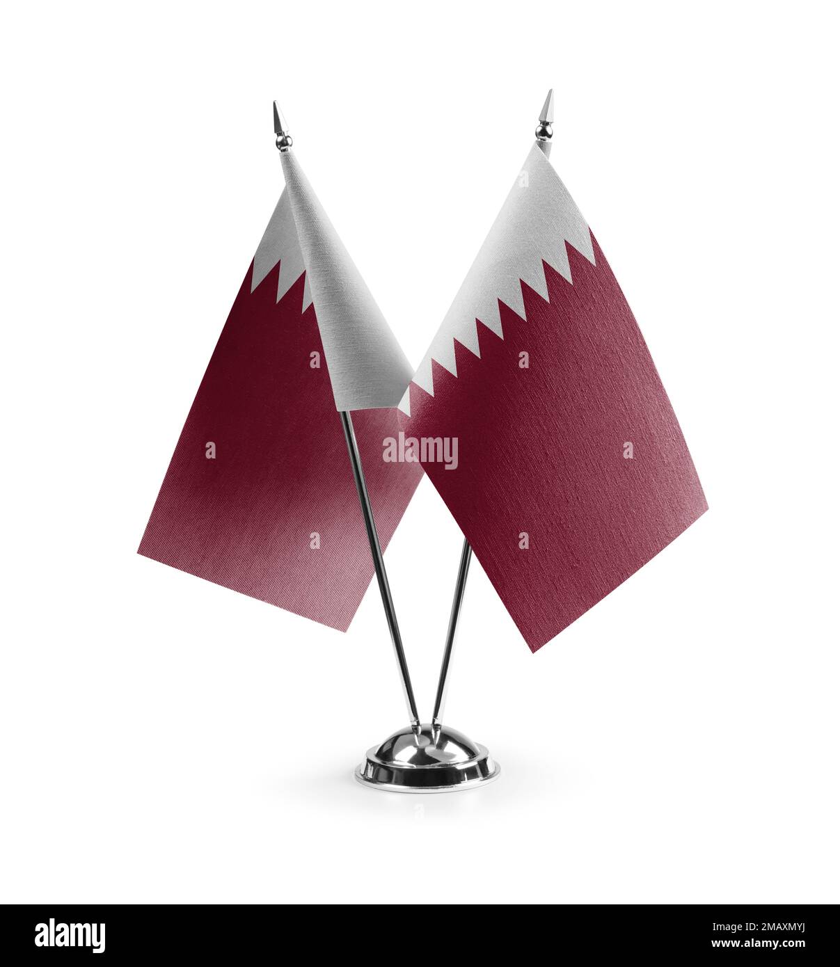 Small national flags of the Qatar on a white background Stock Photo - Alamy