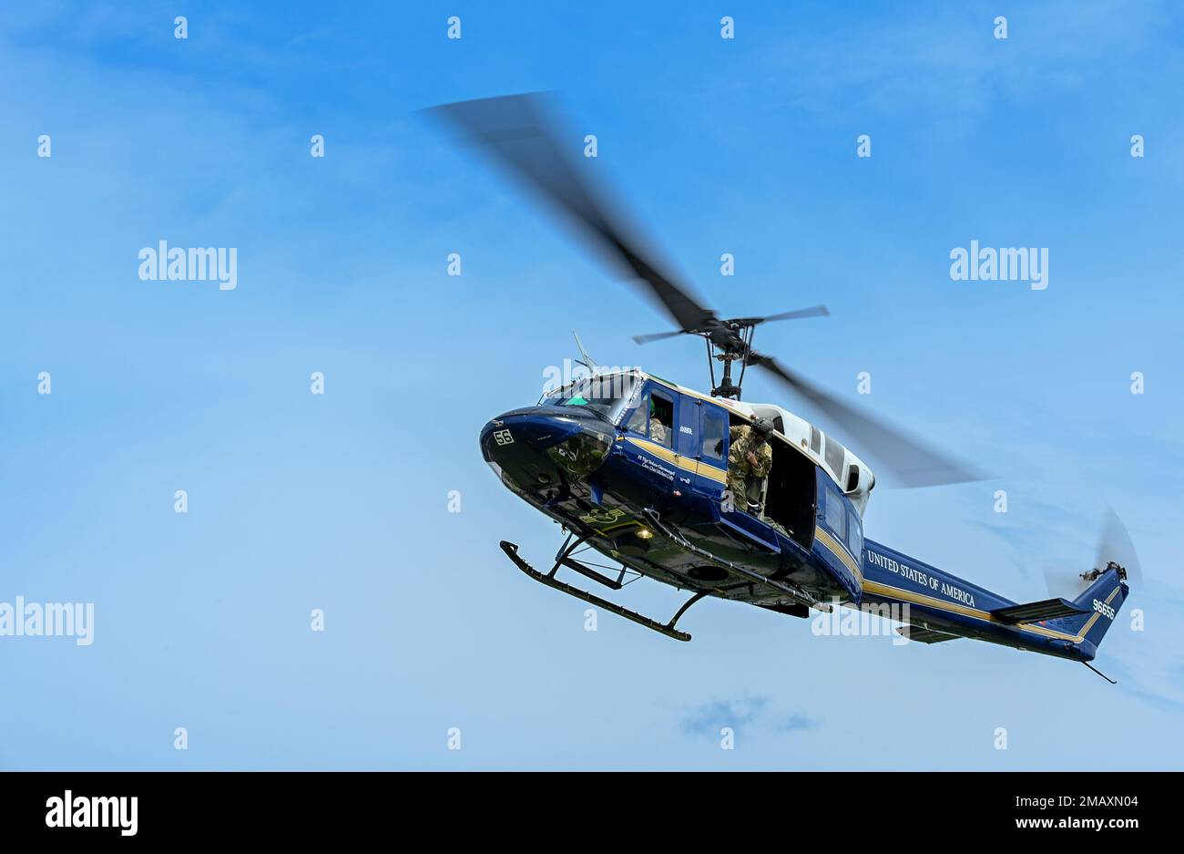 A UH-1 Huey helicopter flown by the 1st Helicopter Squadron assigned ...