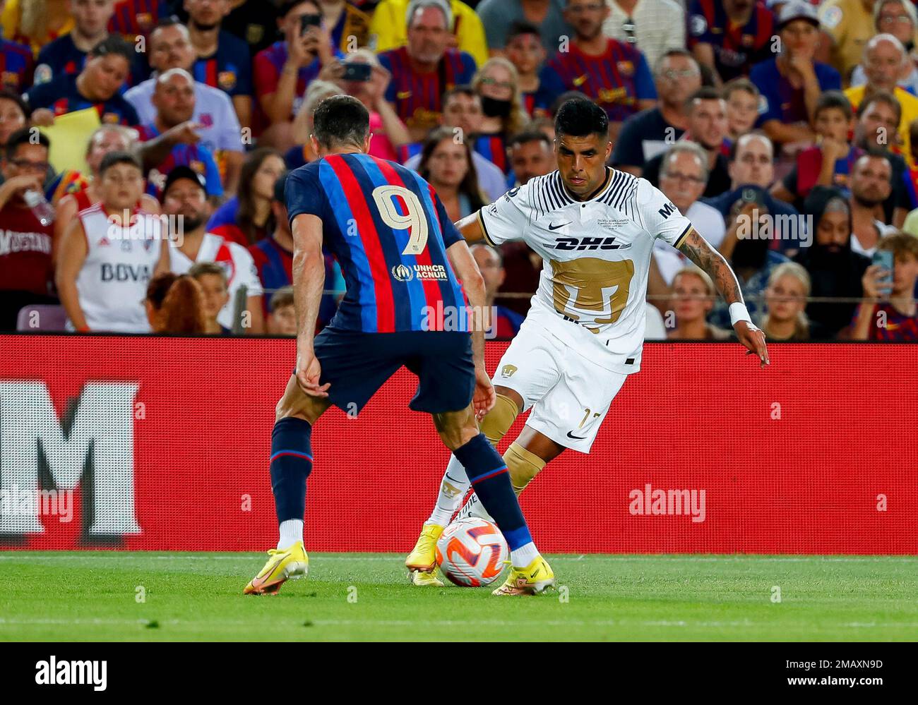 Mexico's Pumas Leonel Lopez, right, controls the ball in front of ...