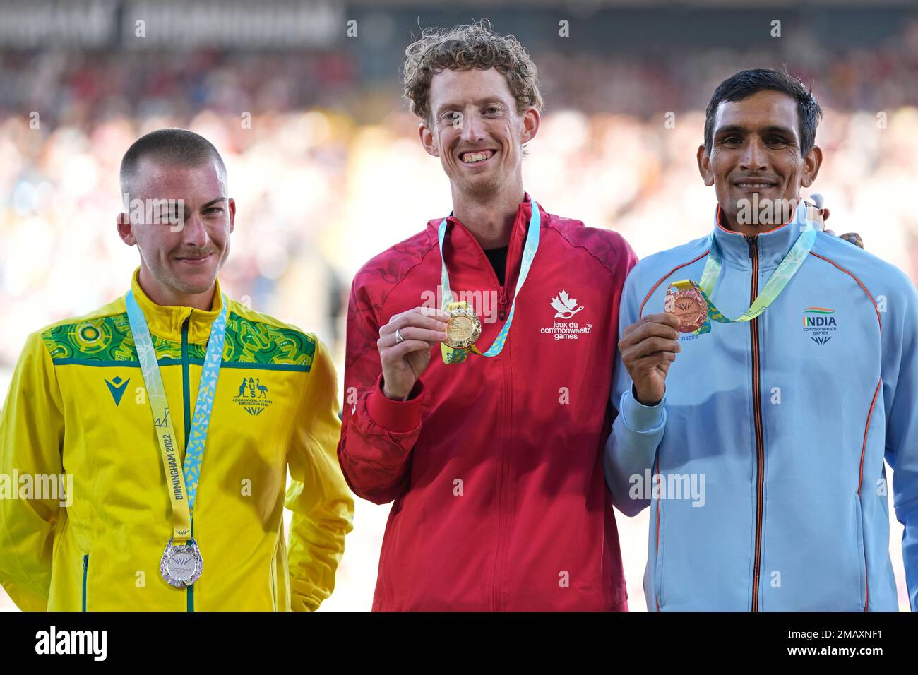 Silver medalist Declan Tingay of Australia, gold medalist Evan Dunfee ...