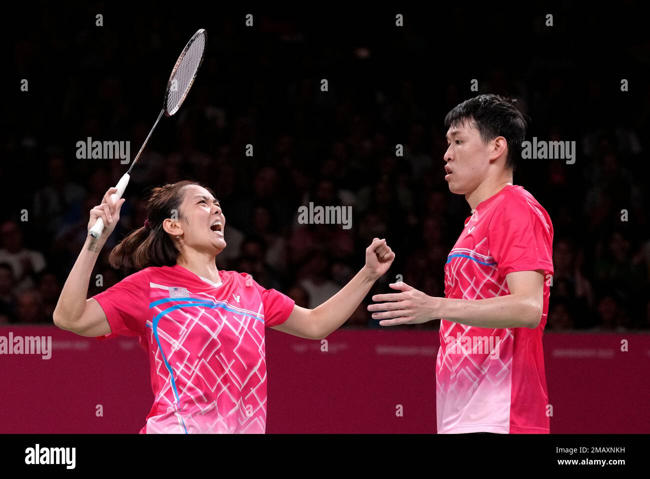 Tan Kian Meng, right, and Lai Pei Jing of Malaysia celebrate winning ...
