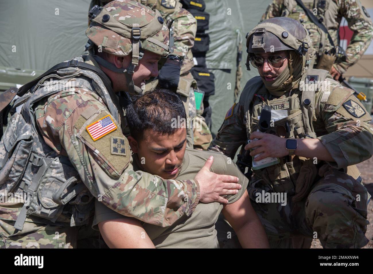 Staff Sgt. Johnny Hunter and Spc. Dylan Hellier, a health care ...
