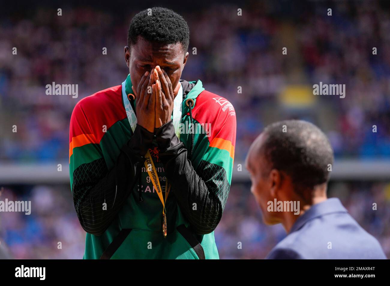 Men's 400 meters gold medalist Muzala Samukonga, of Zambia reacts on ...