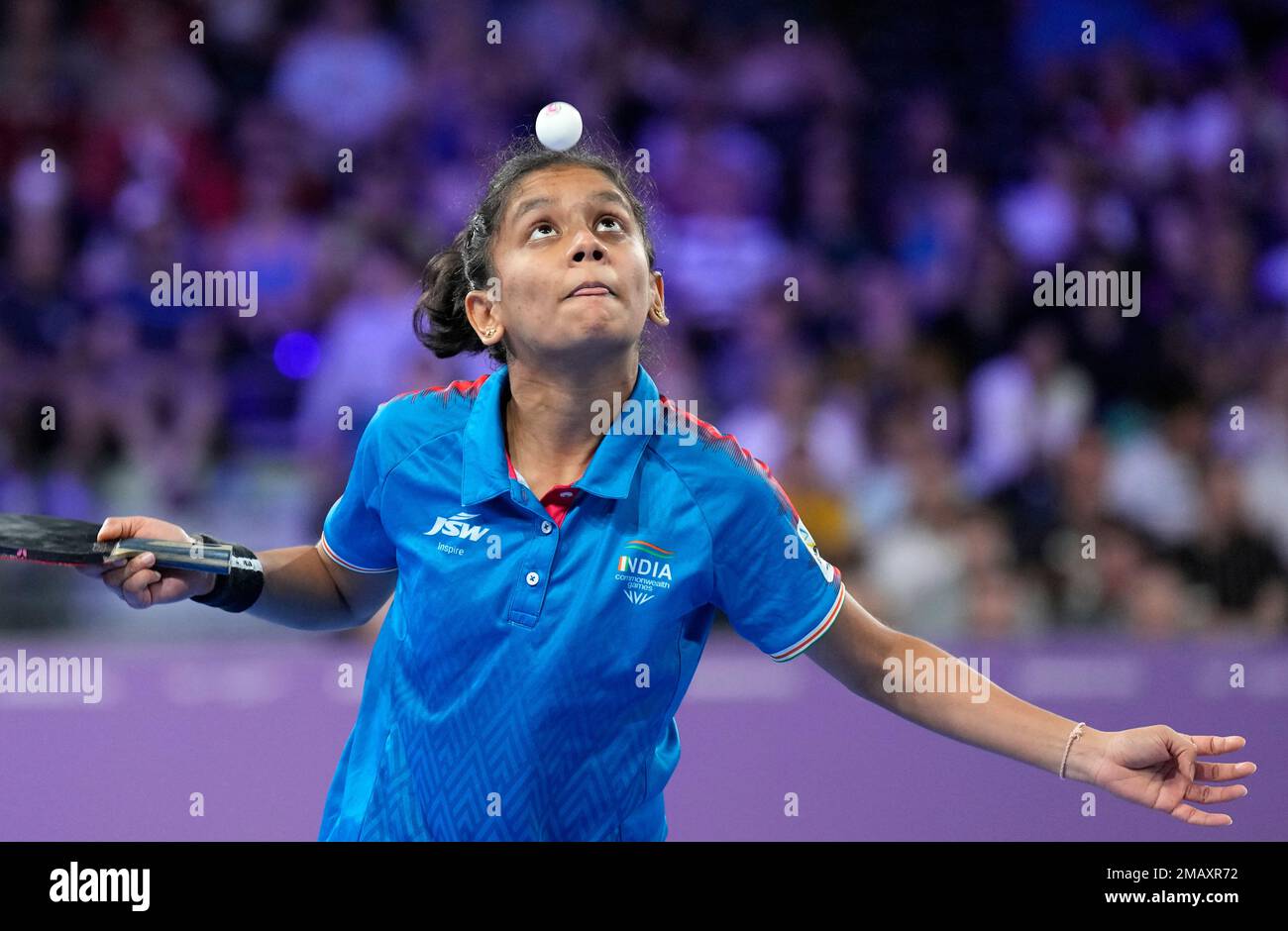 India's Sreeja Akula serves during the women's bronze medal table ...