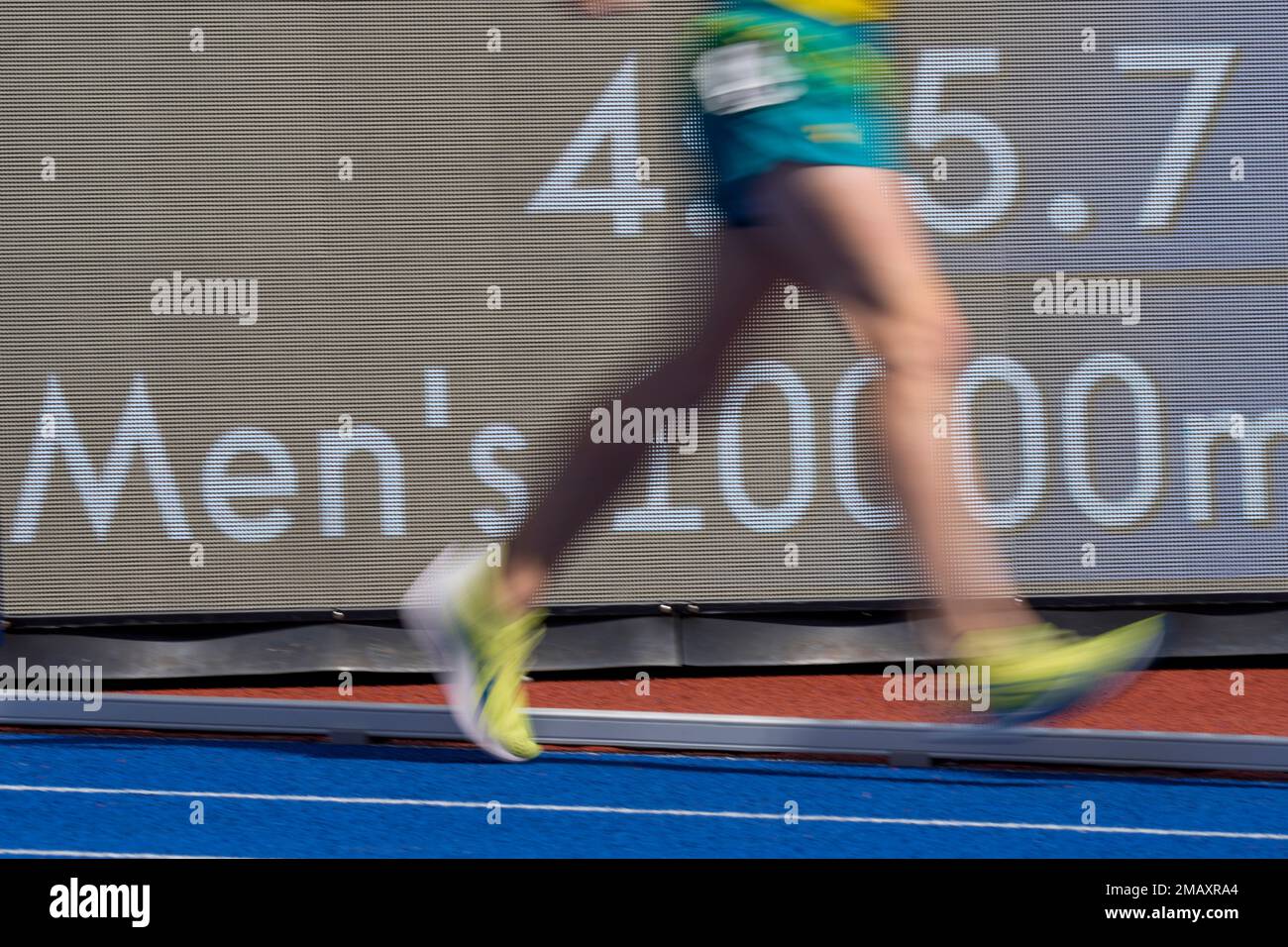 A runner competes in the men's 10,000 meter walk during the athletics ...