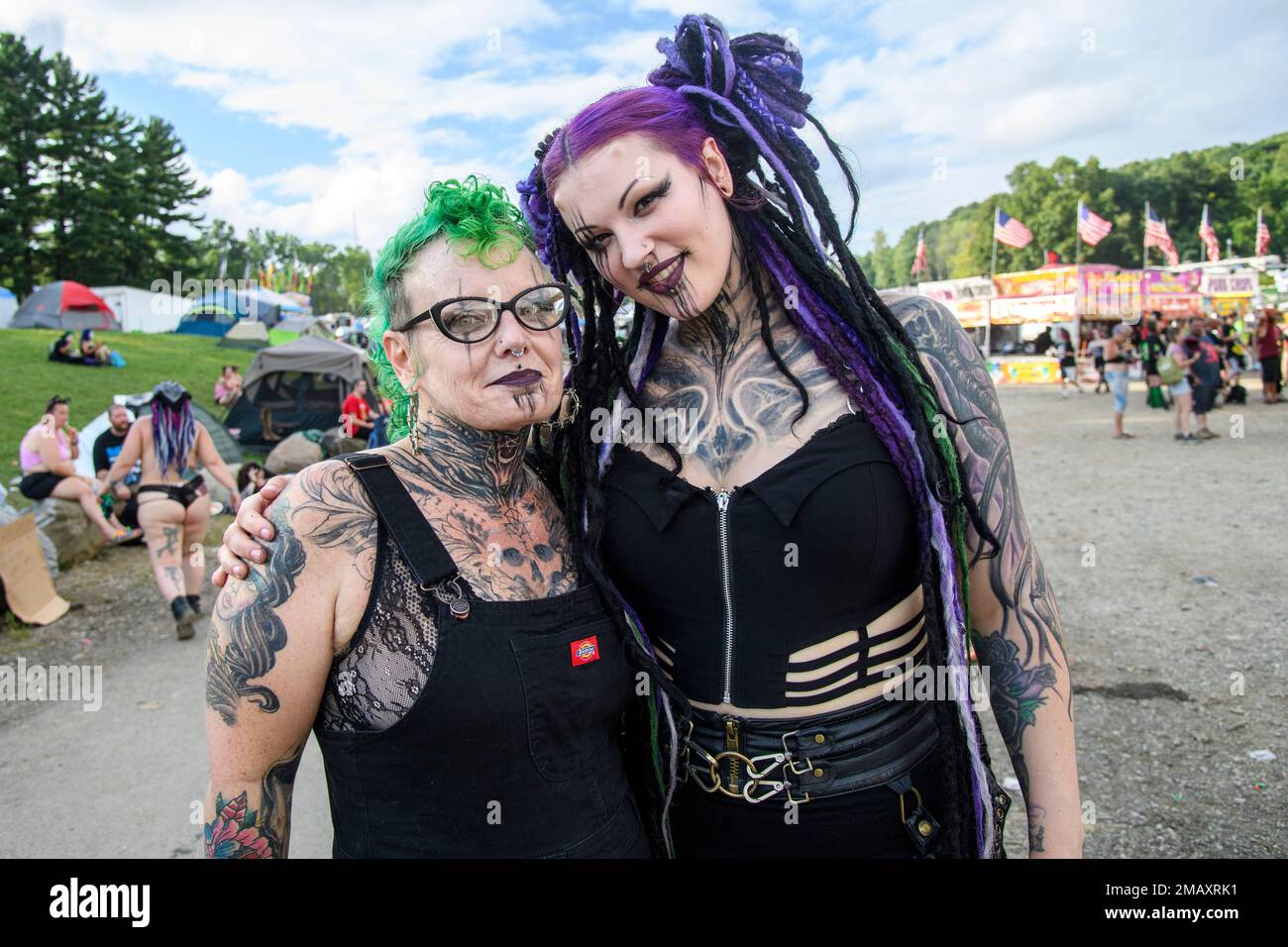 Fans pose for a photo during the 2022 Gathering of the Juggalos ...
