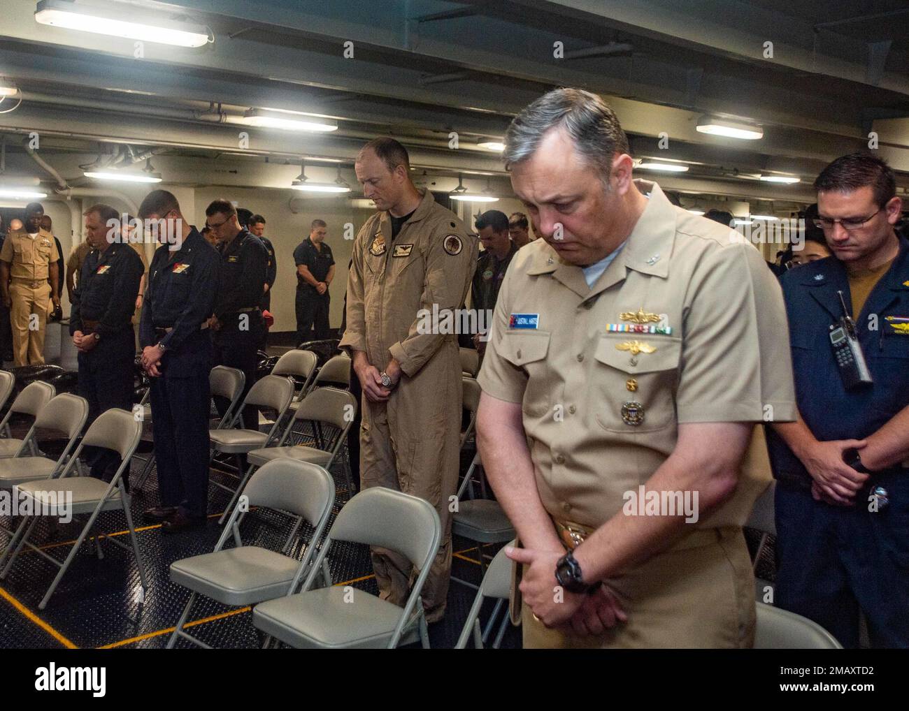 220607-N-YQ181-1029 PACIFIC OCEAN (June 7, 2022) Sailors bow their ...