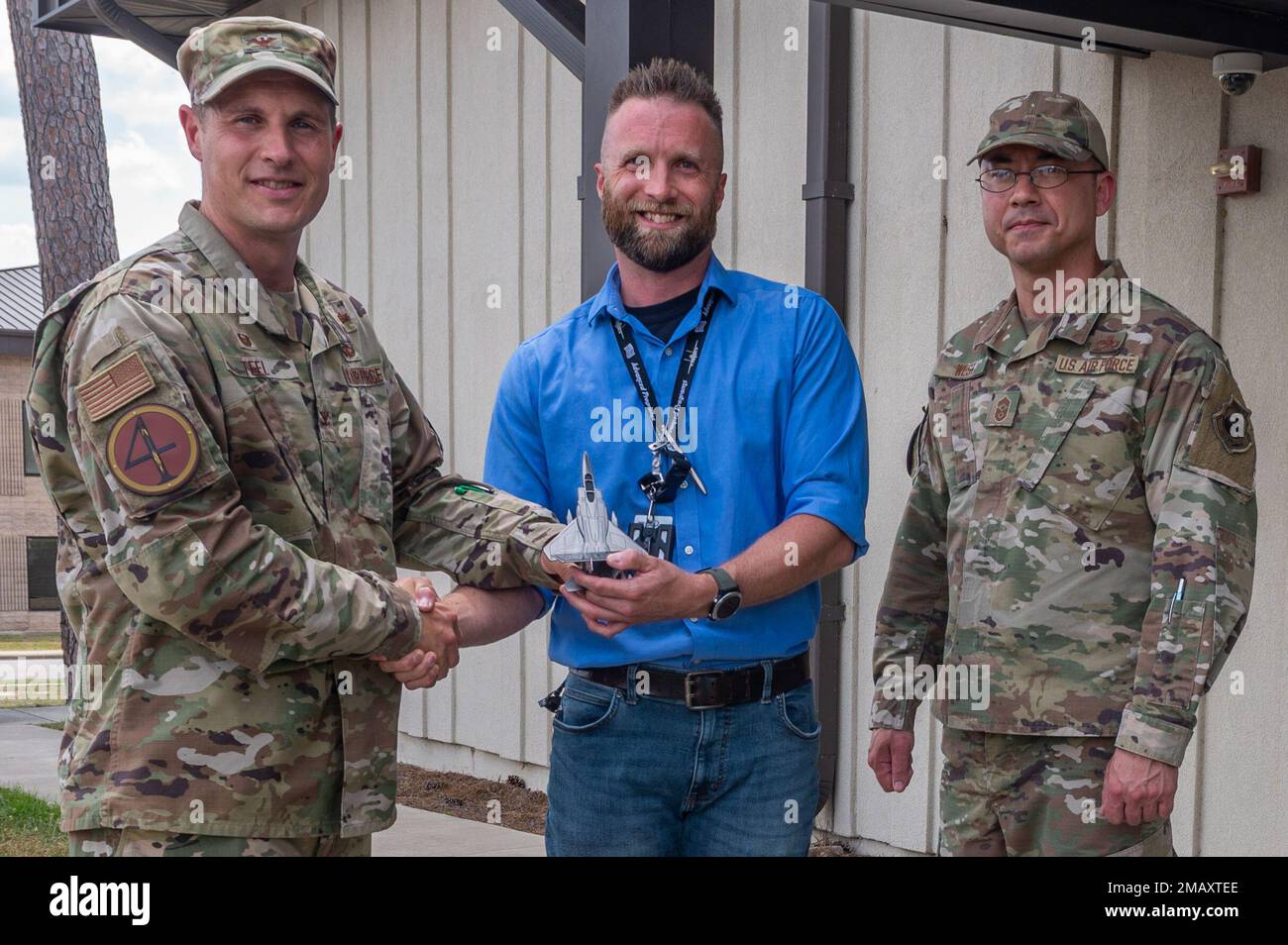 Col. Lucas Teel, 4th Fighter Wing commander (left), and Chief Master ...