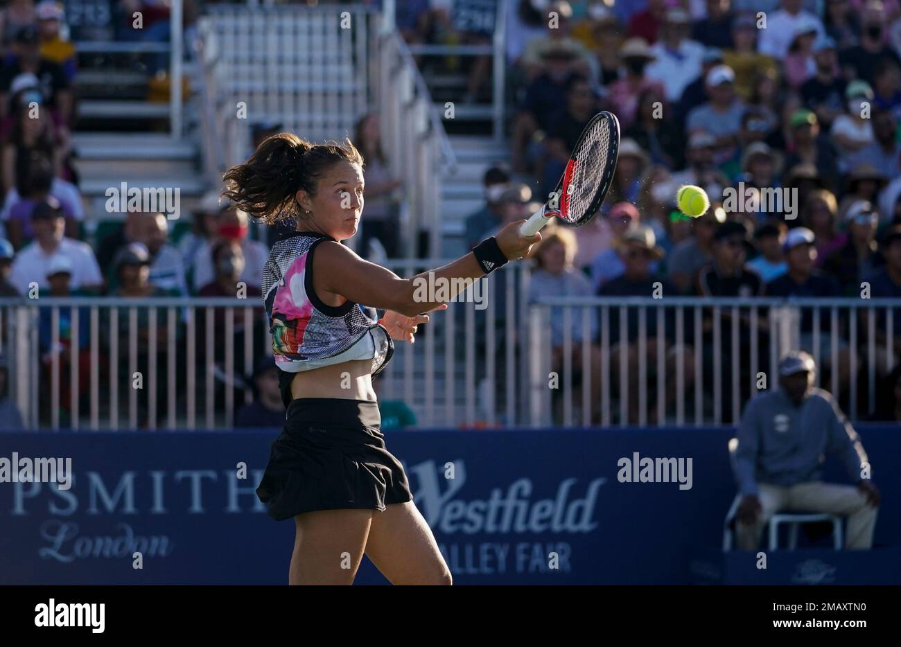 Daria Kasatkina, of Russia, hits a forehand to Paula Badosa, of Spain ...