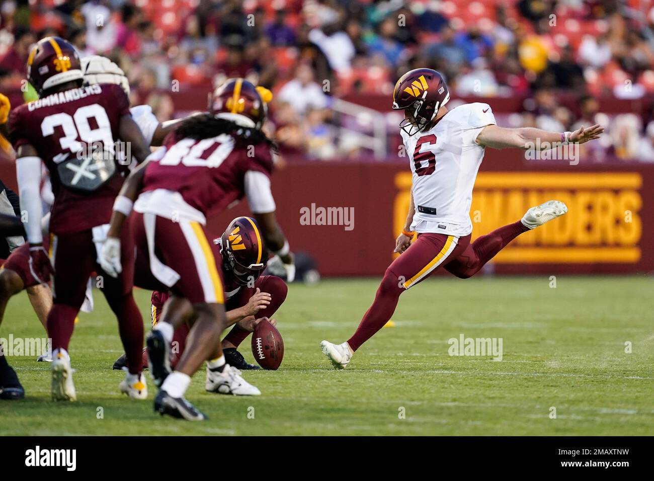 Washington Commanders kicker Joey Slye (6) prepares to kick the ball ...