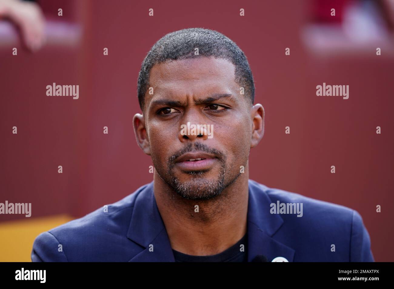 Washington Commanders team president Jason Wright pauses while speaking ...