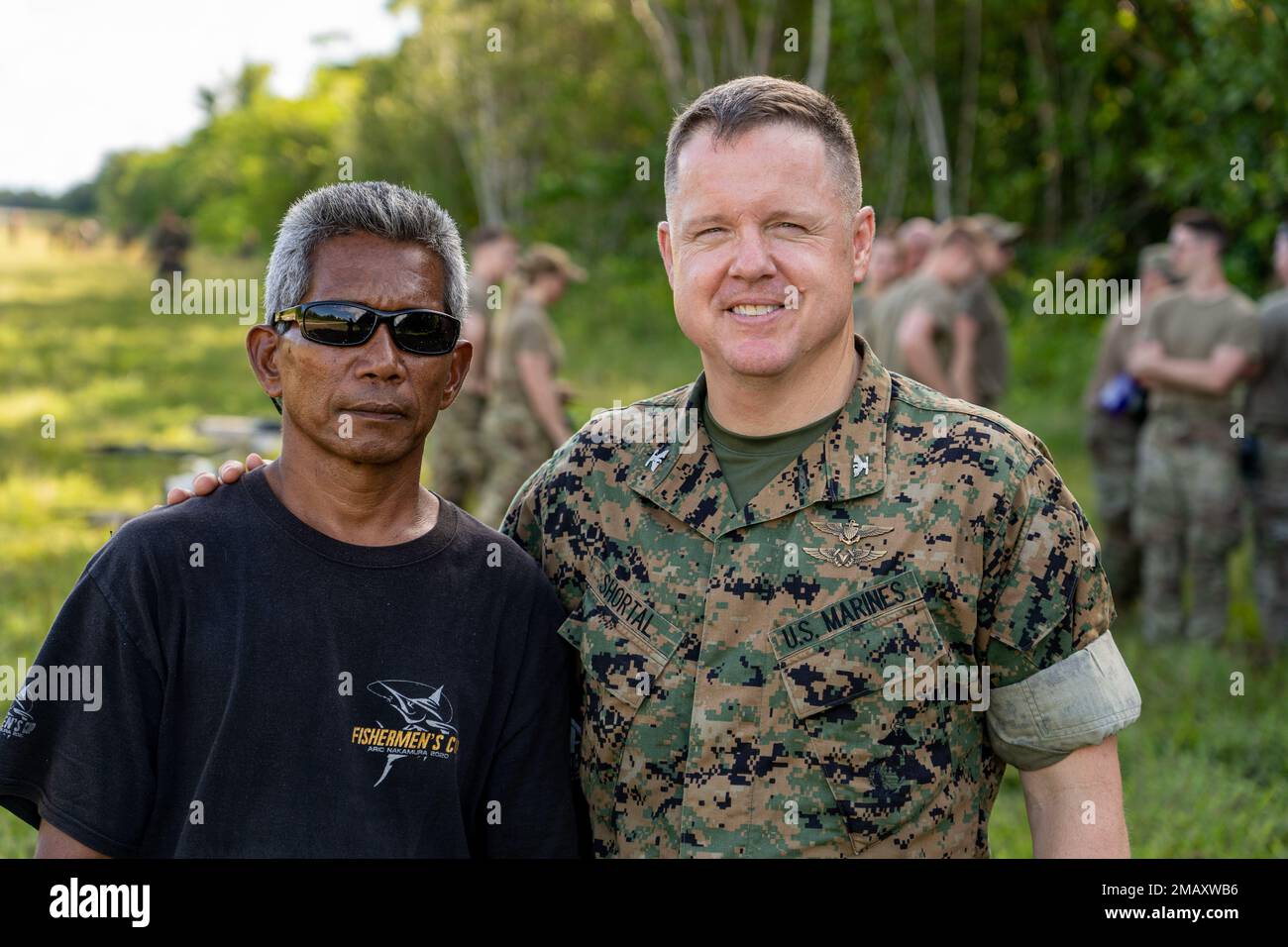 U.S. Marine Corps Col. Matthew Shortal and John Lewis pose for a photo ...