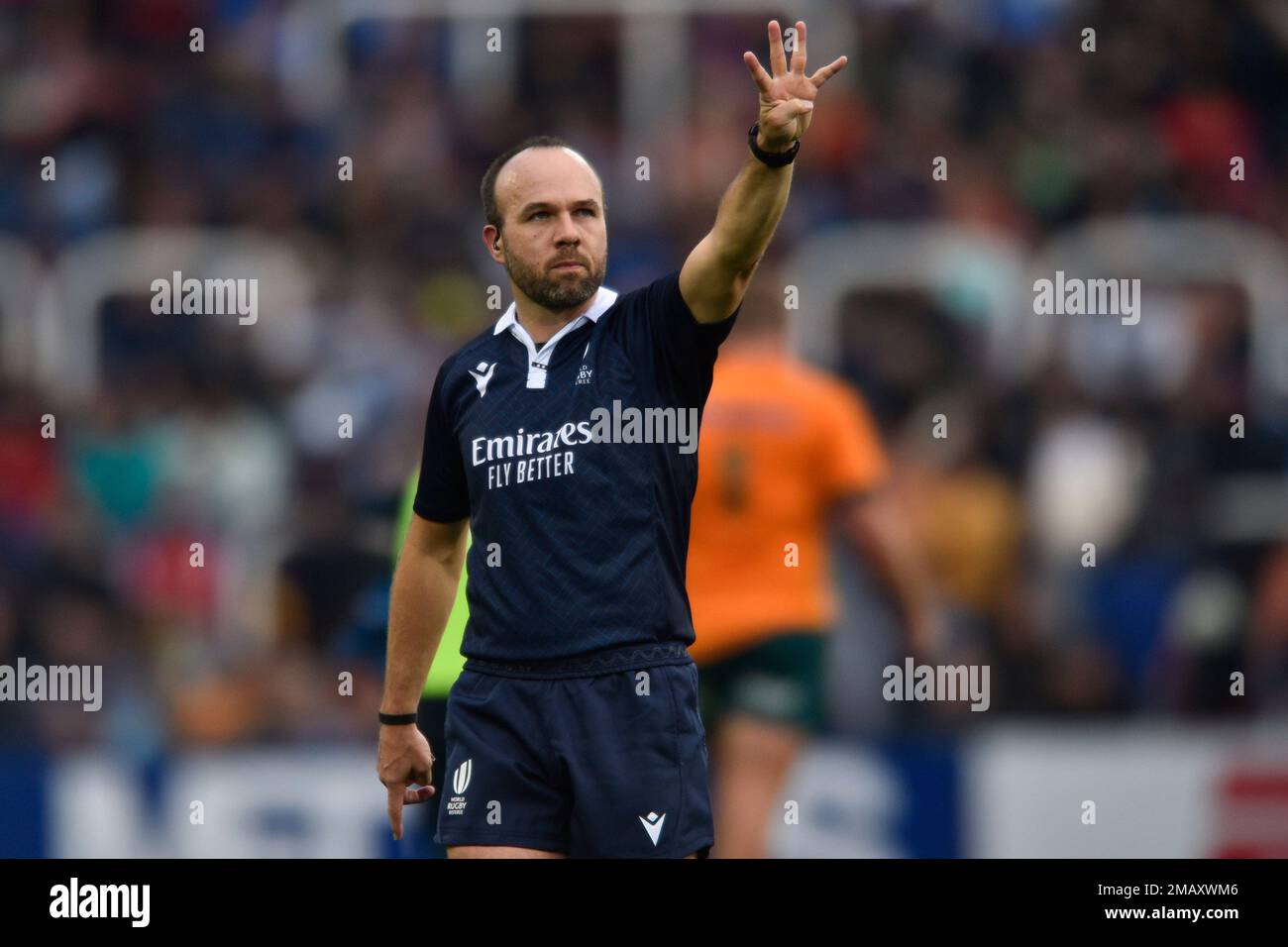 Referee Mike Adamson gestures during a rugby championship match between ...