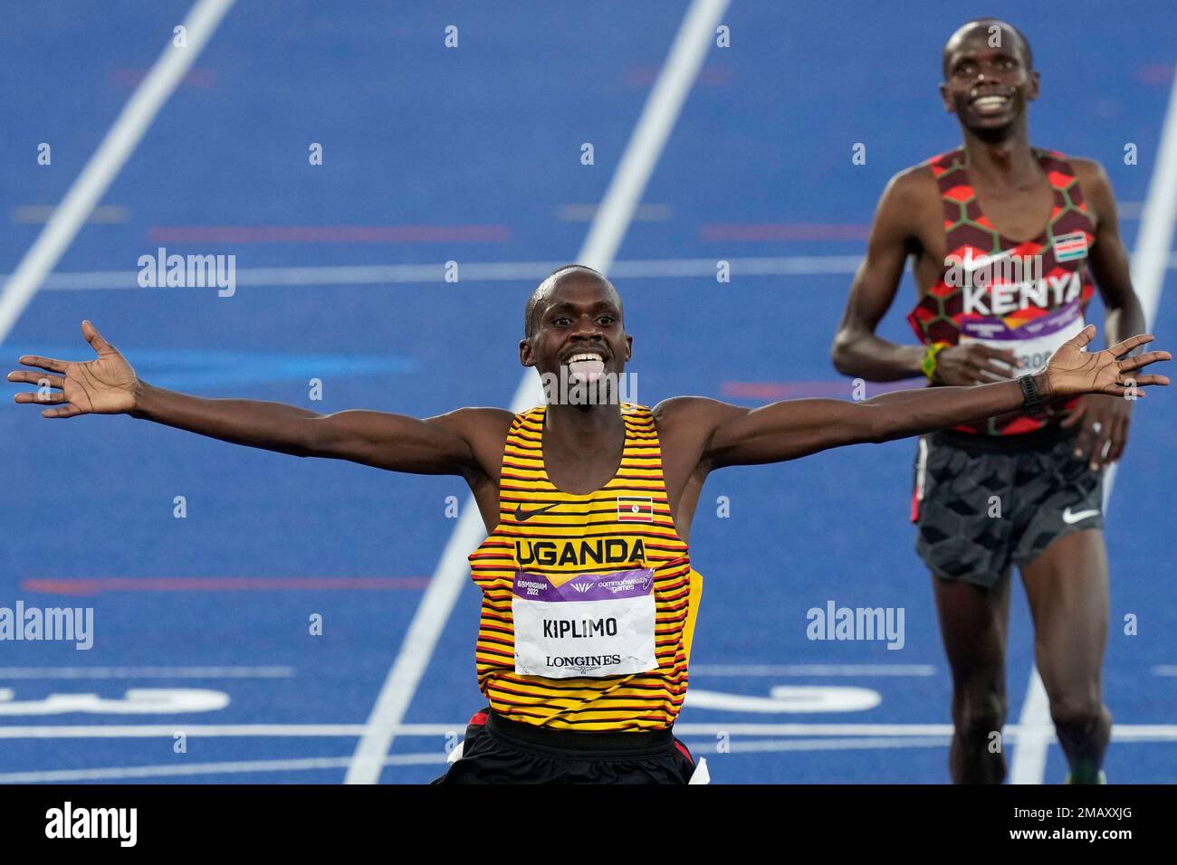 Jacob Kiplimo of Uganda celebrates after winning the gold medal in the ...