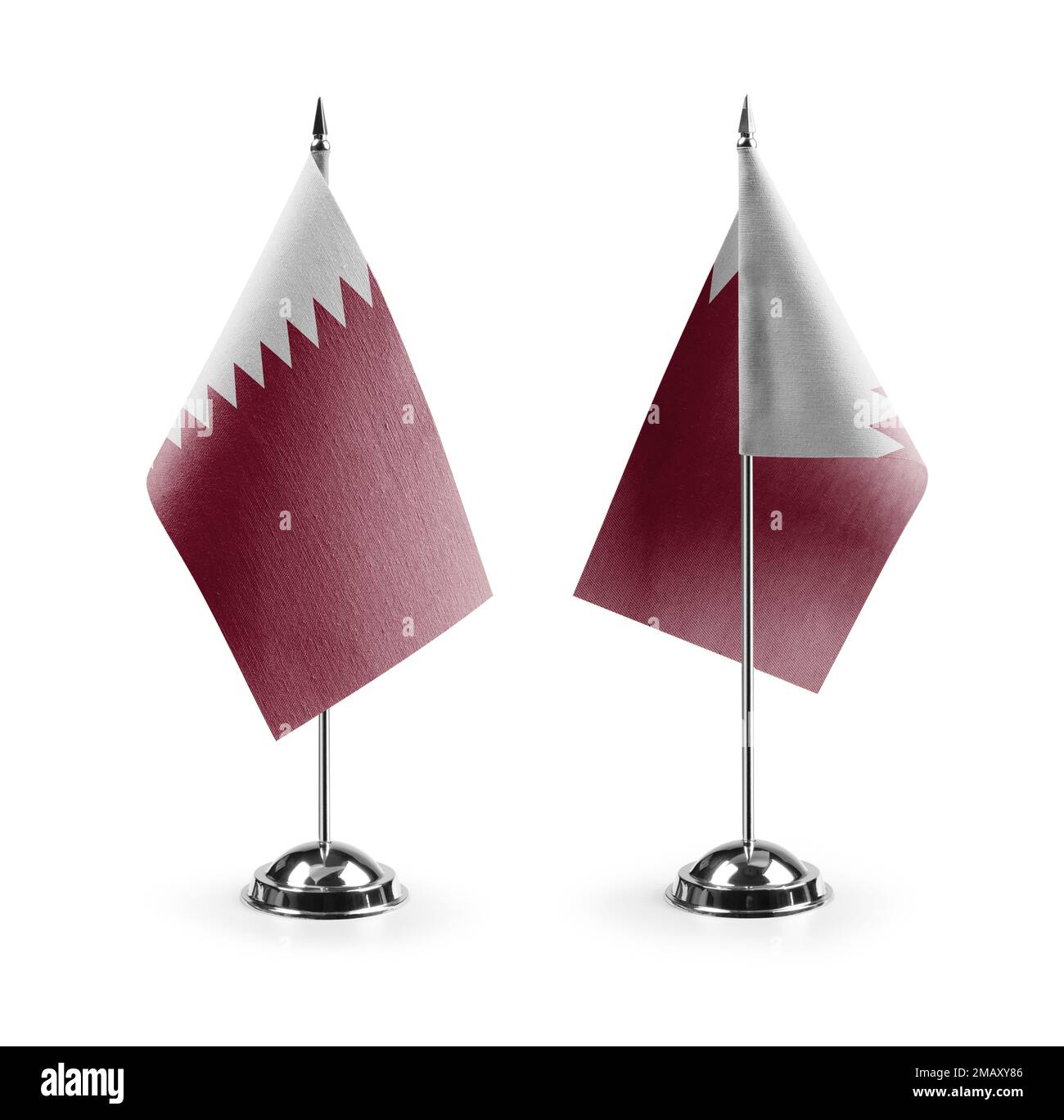 Small national flags of the Qatar on a white background Stock Photo - Alamy